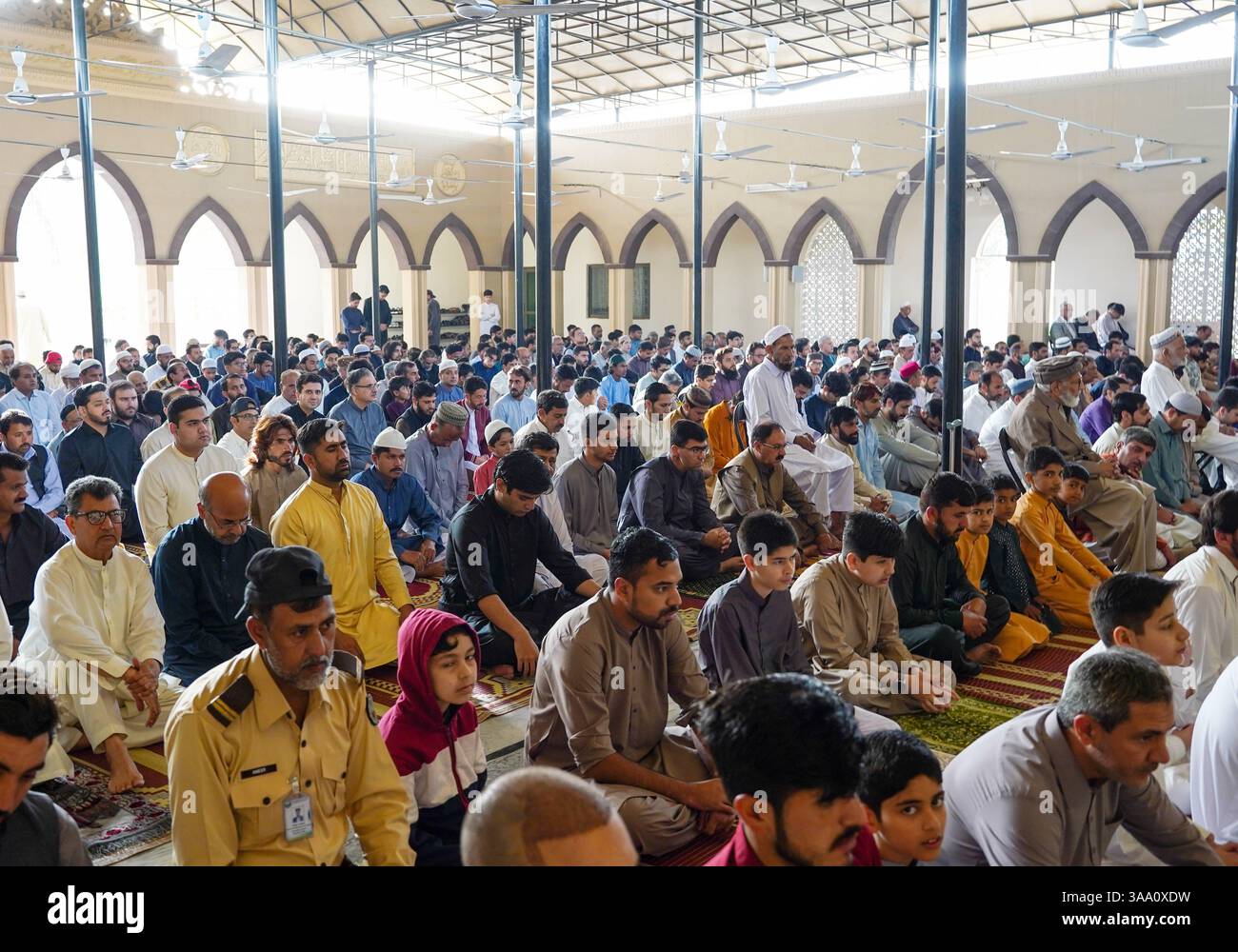 Islambad, Pakistan. 31st Mar, 2025. People offer prayers during Eid al ...