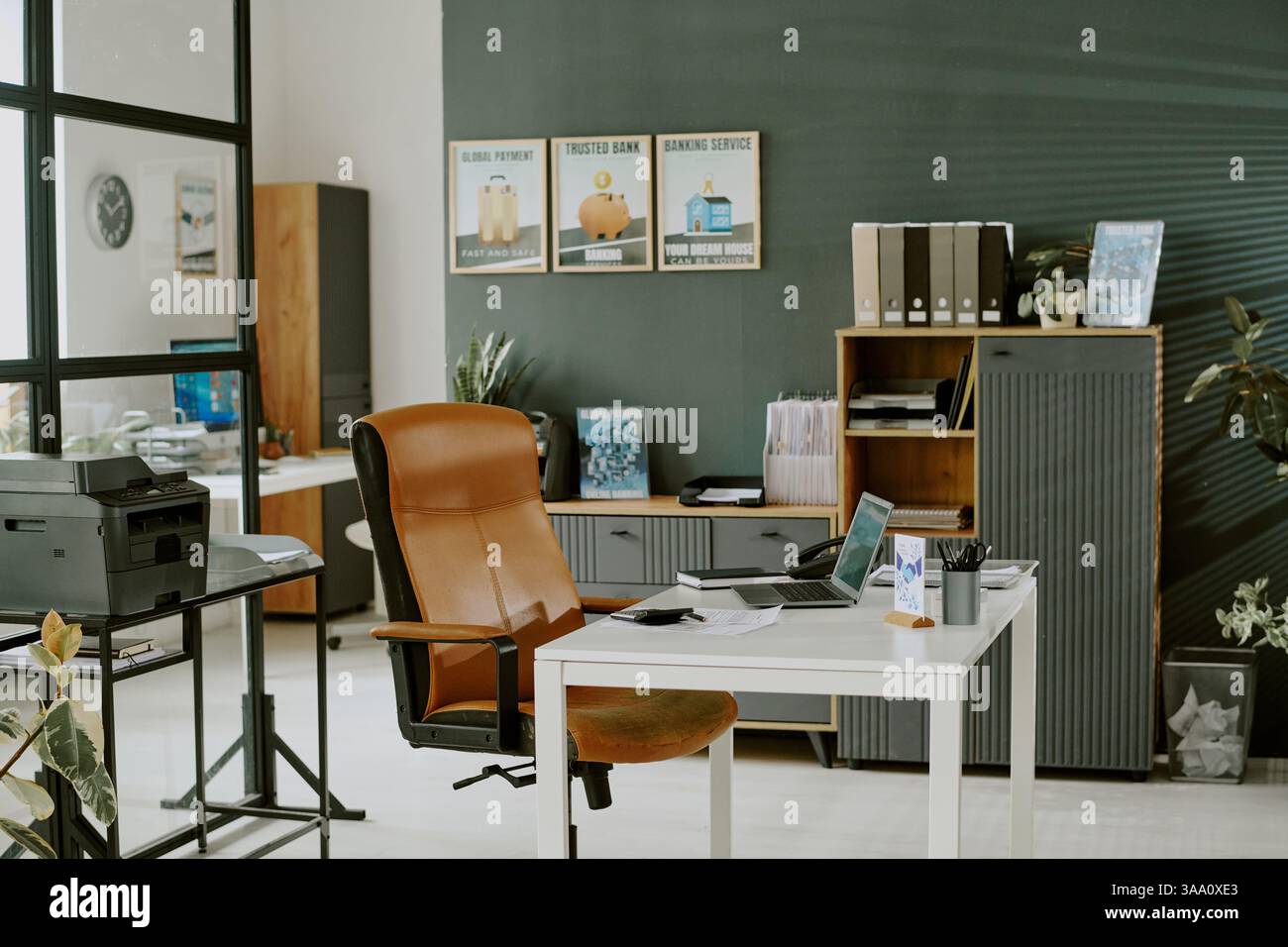 Modern office with organized furniture featuring desk, chair, printer ...