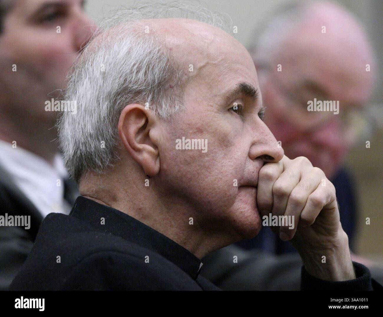 May 04, 2006; Toledo, OH, USA; Rev. GERALD ROBINSON listens during his ...