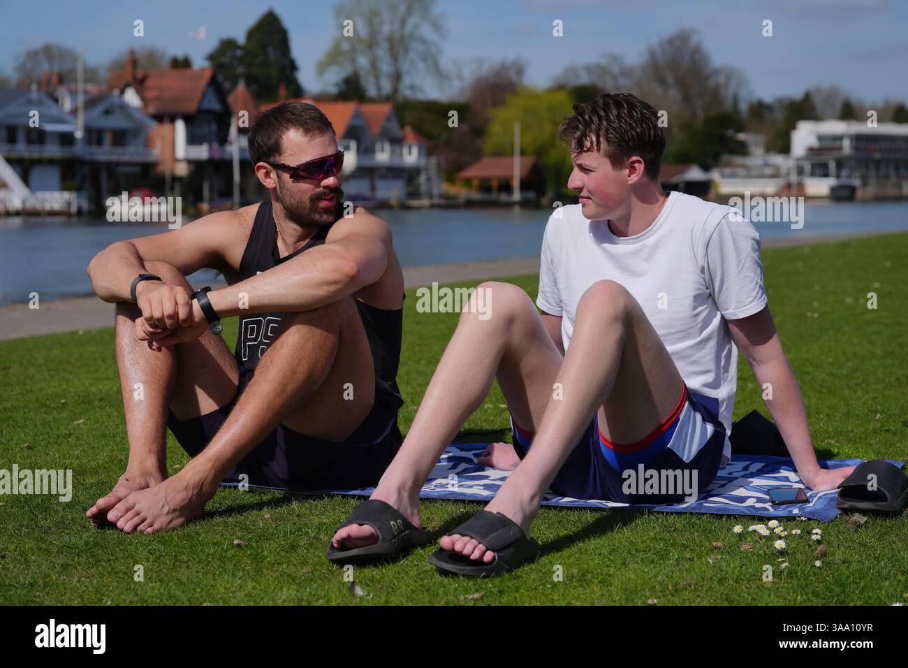 Tom Brumwell (left) and Byron Richards enjoy the good weather beside ...