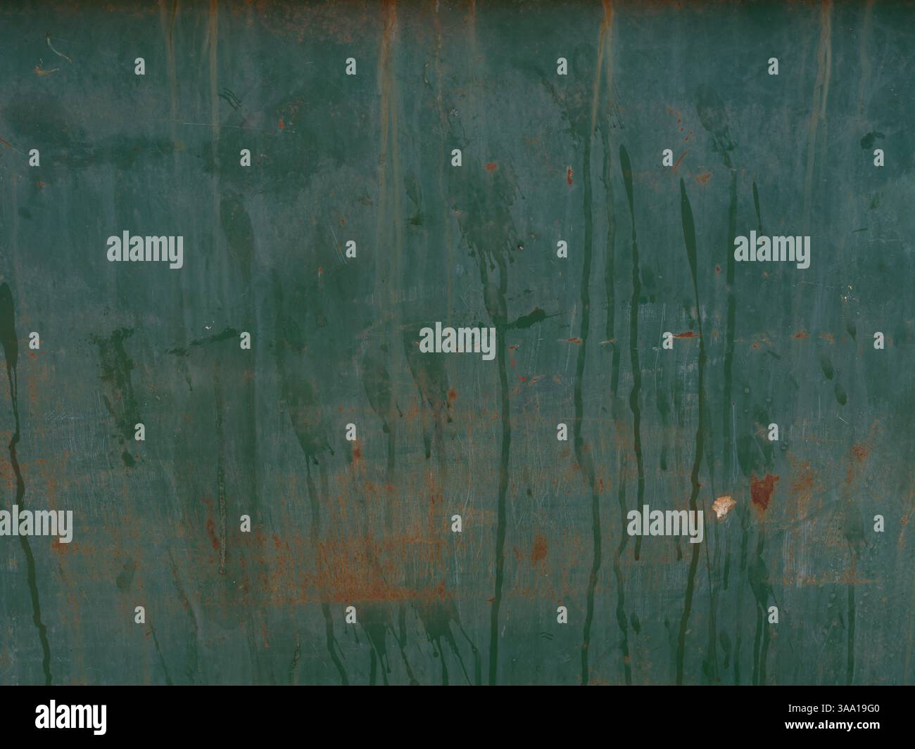 Close-up of weathered metal surface with green paint, rust stains, and ...