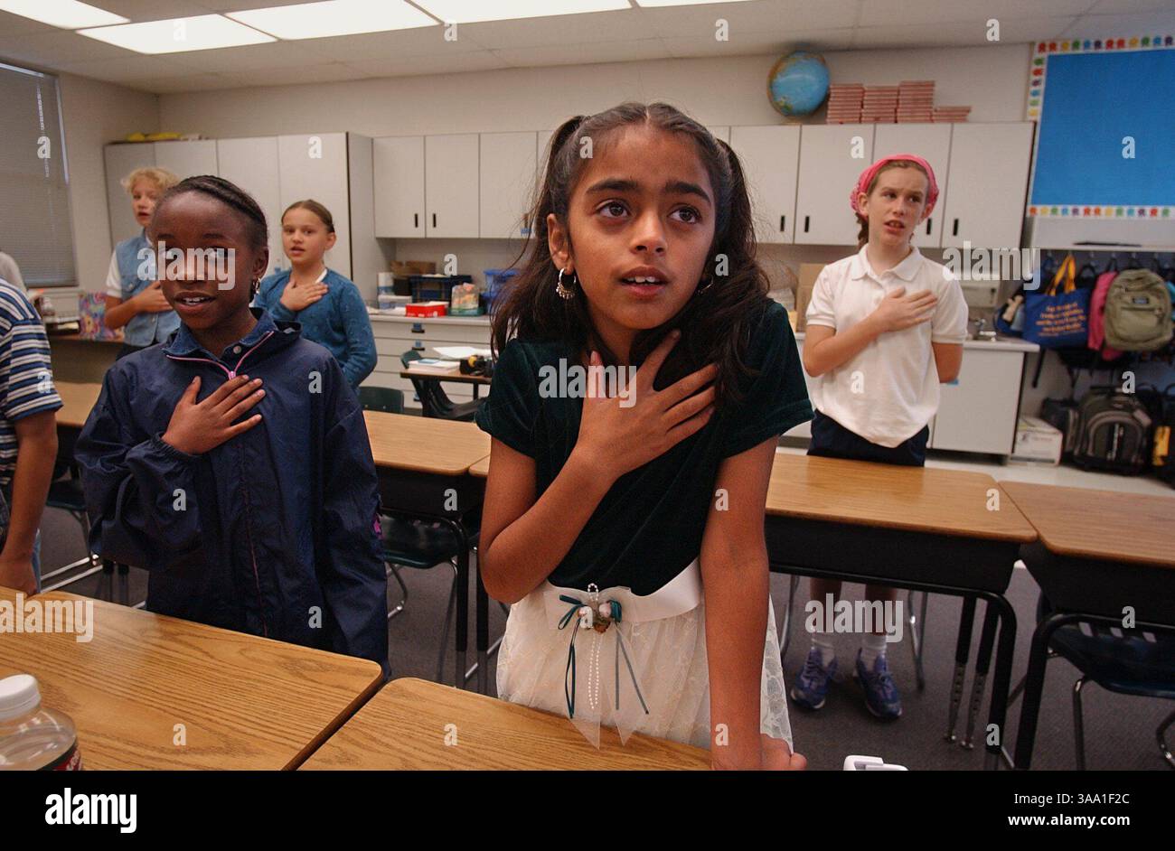 Mrs. Carlson's 4th grade class students Kiran Boparai (cq-center), Dani ...