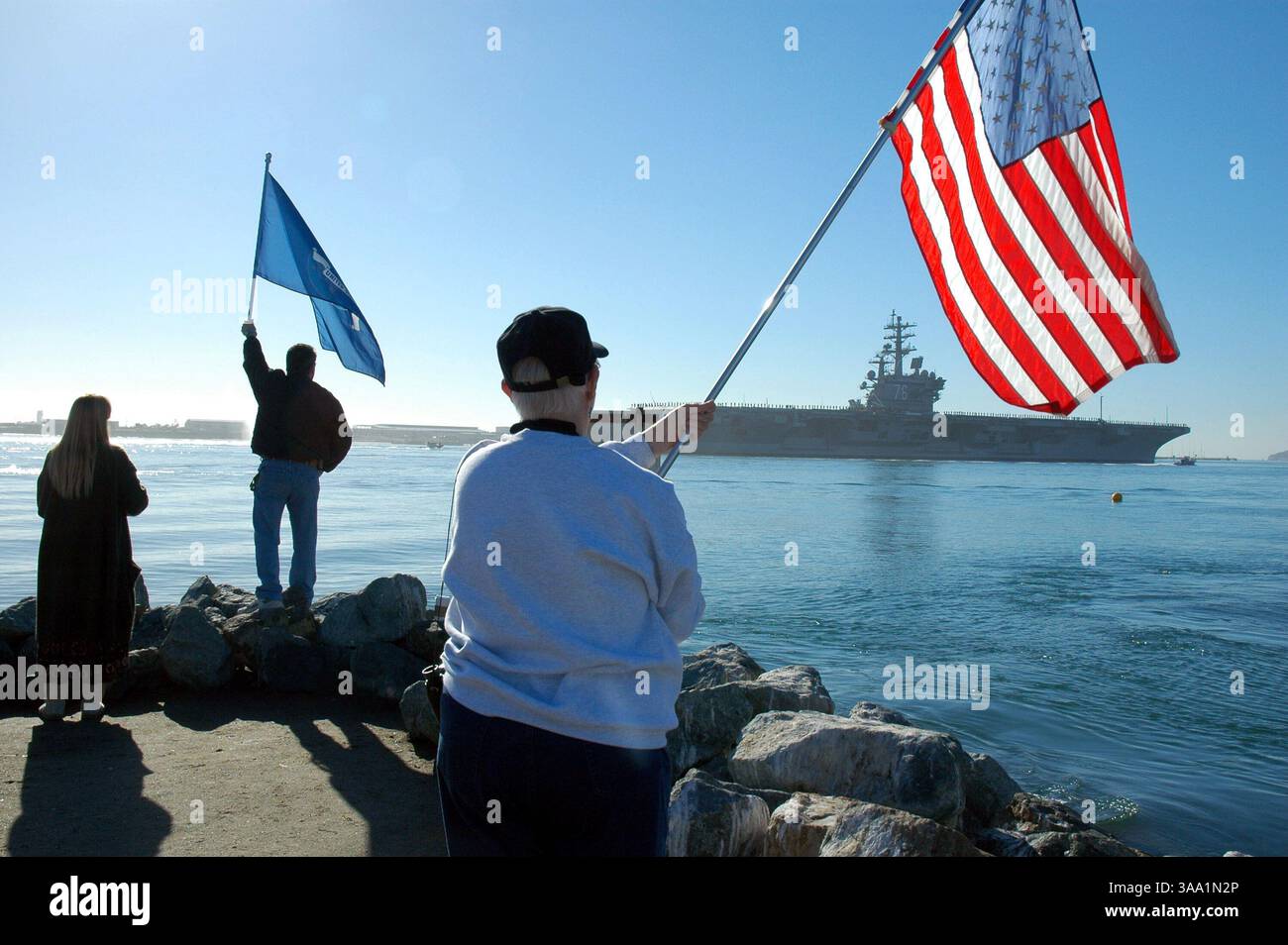 Jan 04, 2006; Coronado, CA, USA; BETTY SCHEID waves the American flag ...