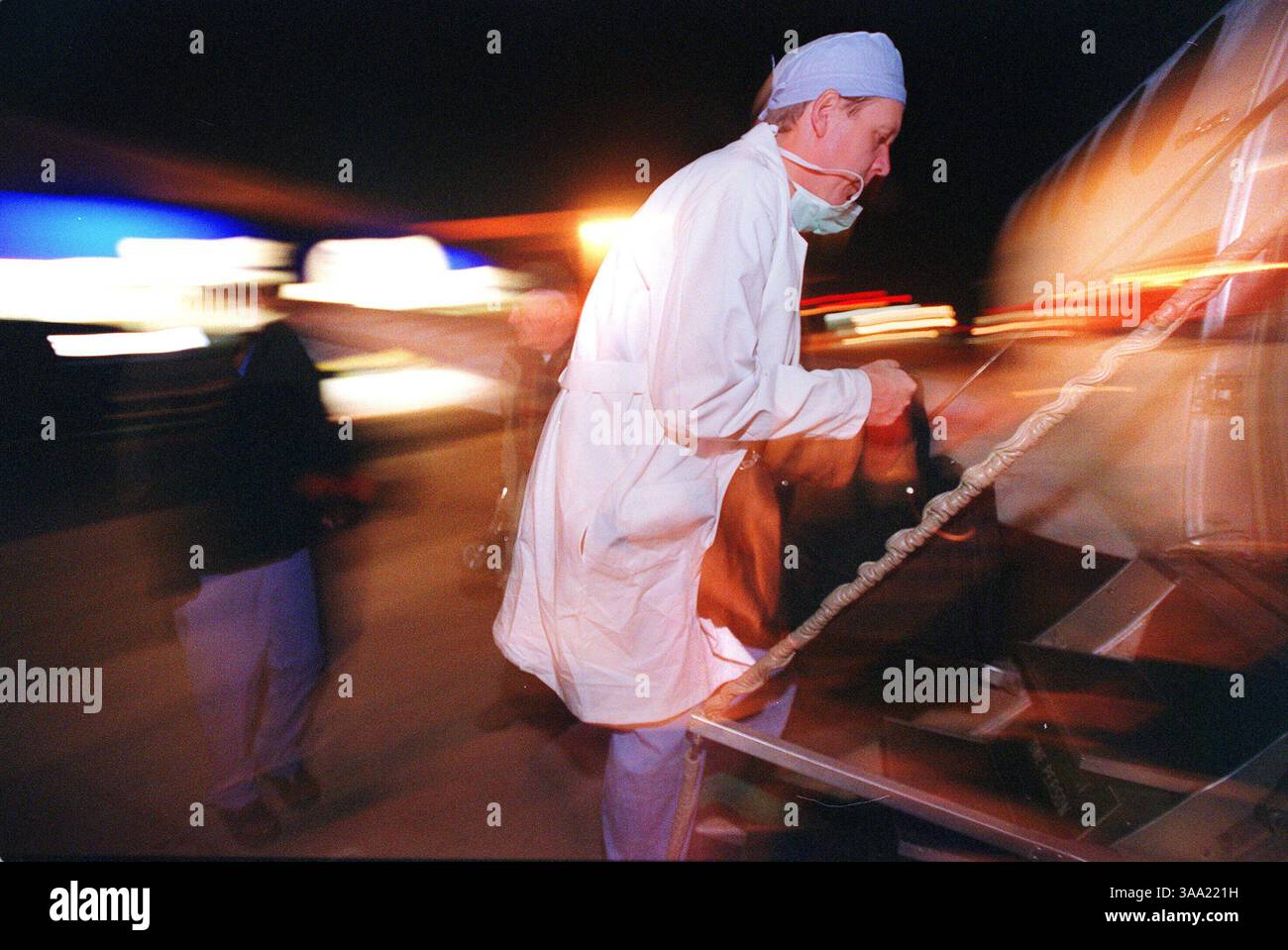 Surgeon Dr. Charles Hoops boards the plane following the recovery surgery to fly back to San ...