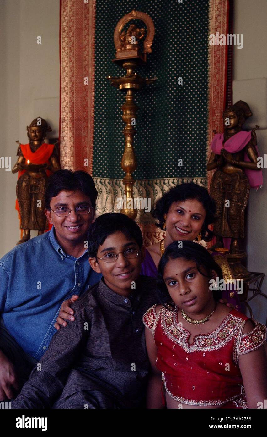 THIRD - From left to right, Ramesh Vasu (cq, RAMESH VASU, dad), Vinayak ...