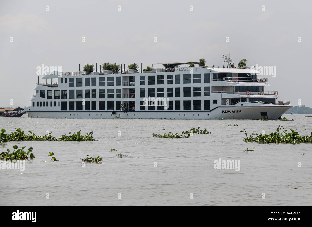 Sa Dec/Cai Be, Vietnam. March 31, 2025: The SCENIC SPIRIT sails amidst ...