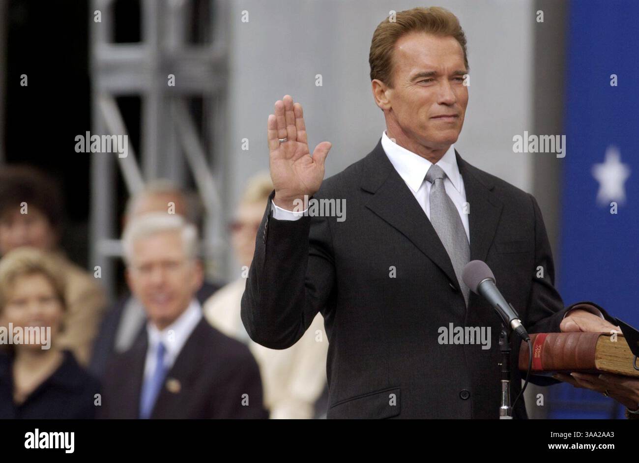 Gov. Gray Davis watches his tem is office end as Gov. Arnold ...