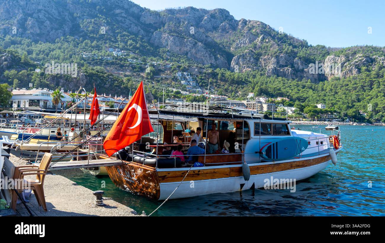 Boats with Turkish flag in marina of village of Turunc, Turkey. Boat ...