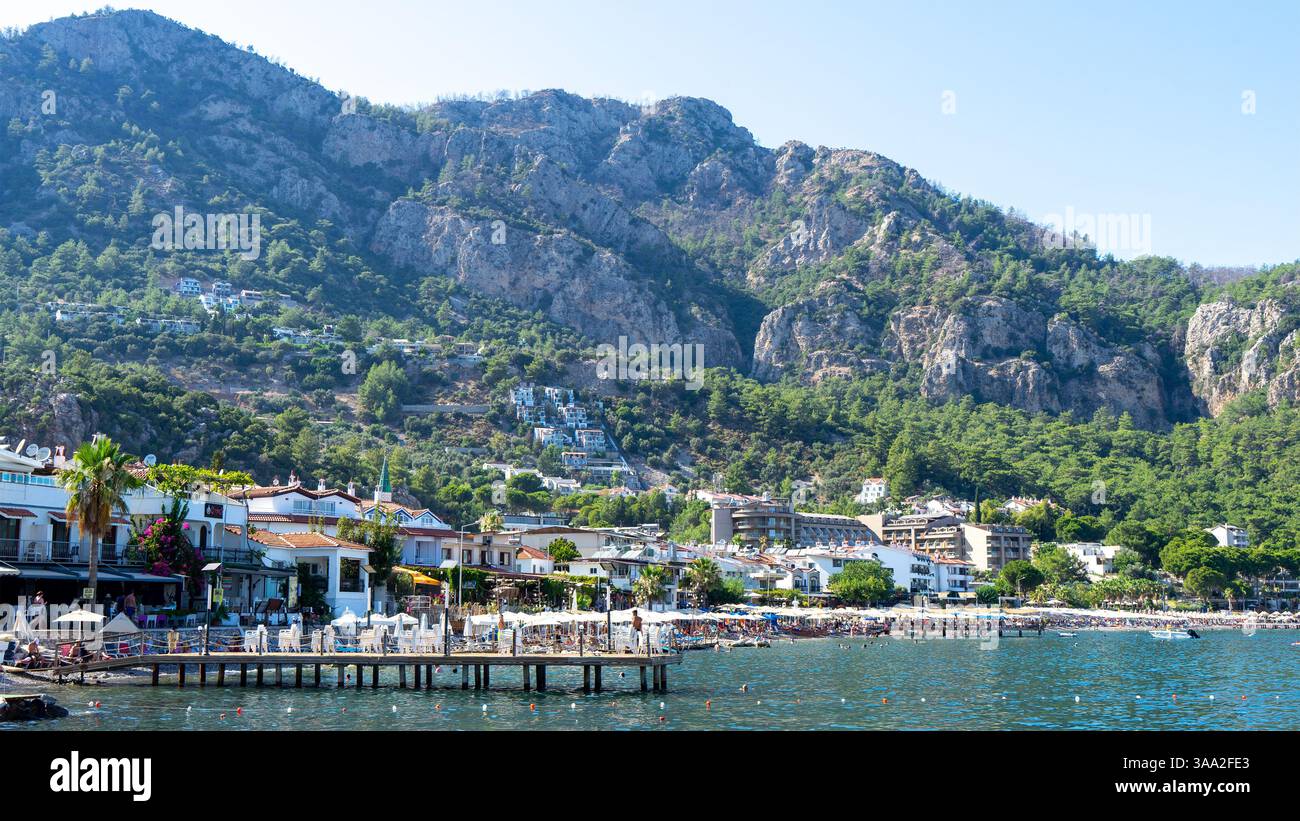 Outdoor cafe on pier on Mediterranean coast in village of Turunc ...