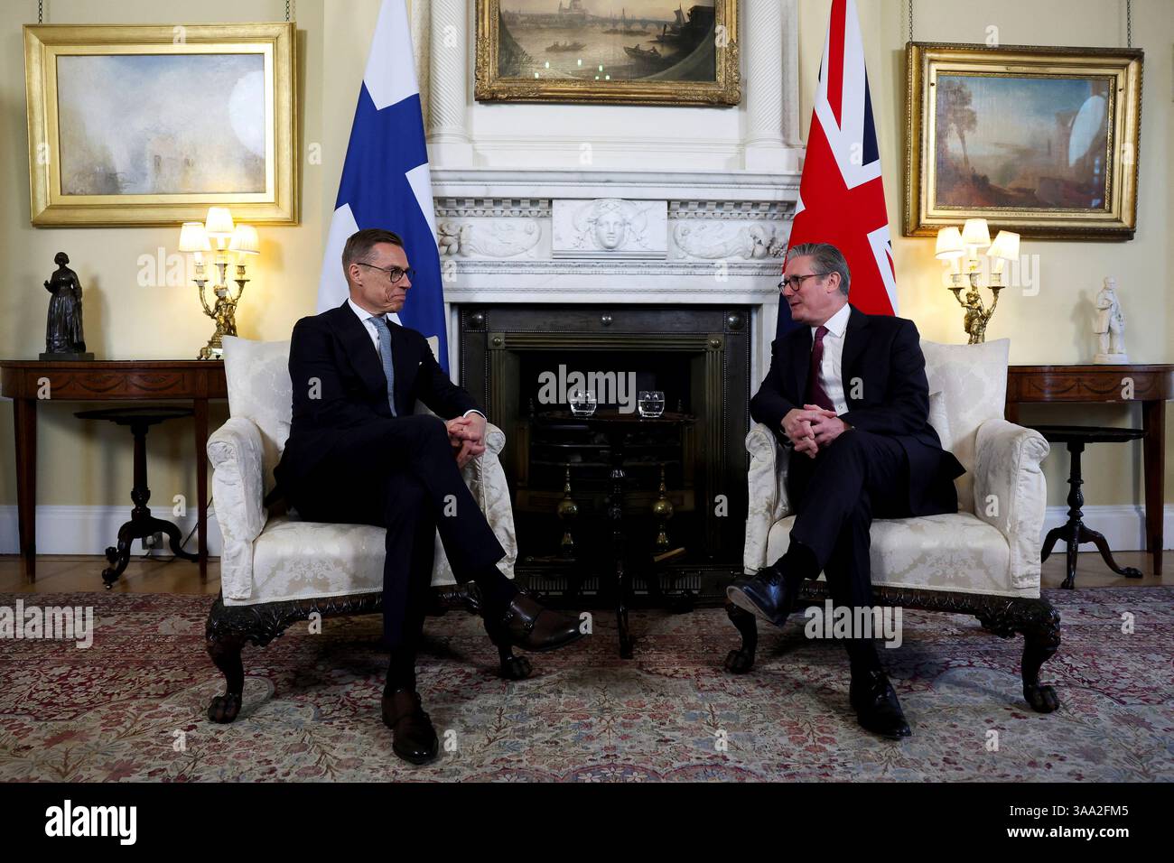 British Prime Minister Keir Starmer, right, meets with Finnish ...