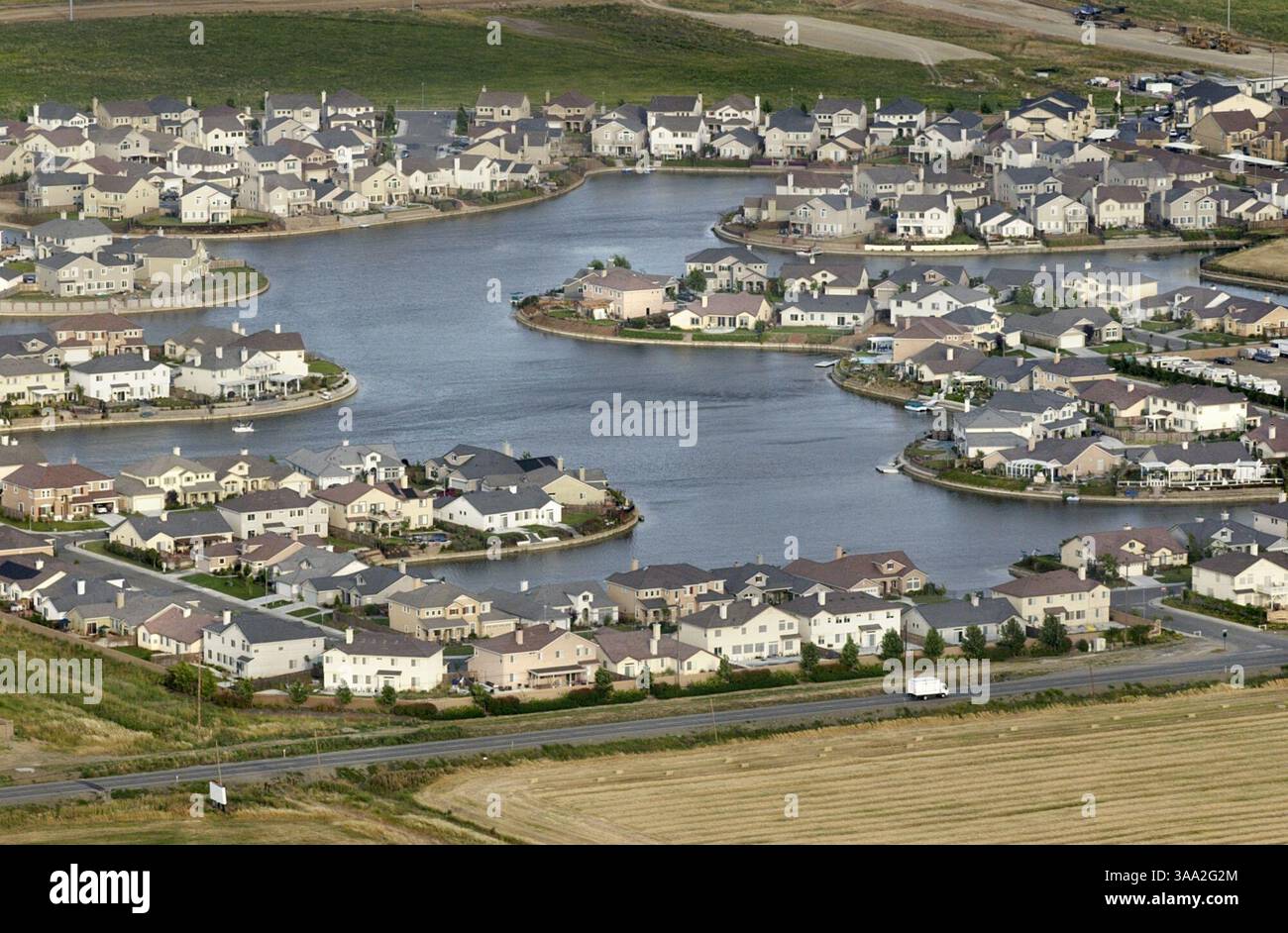 DAY THREE MAIN Aerial view of new homes in the West Lake north of ...