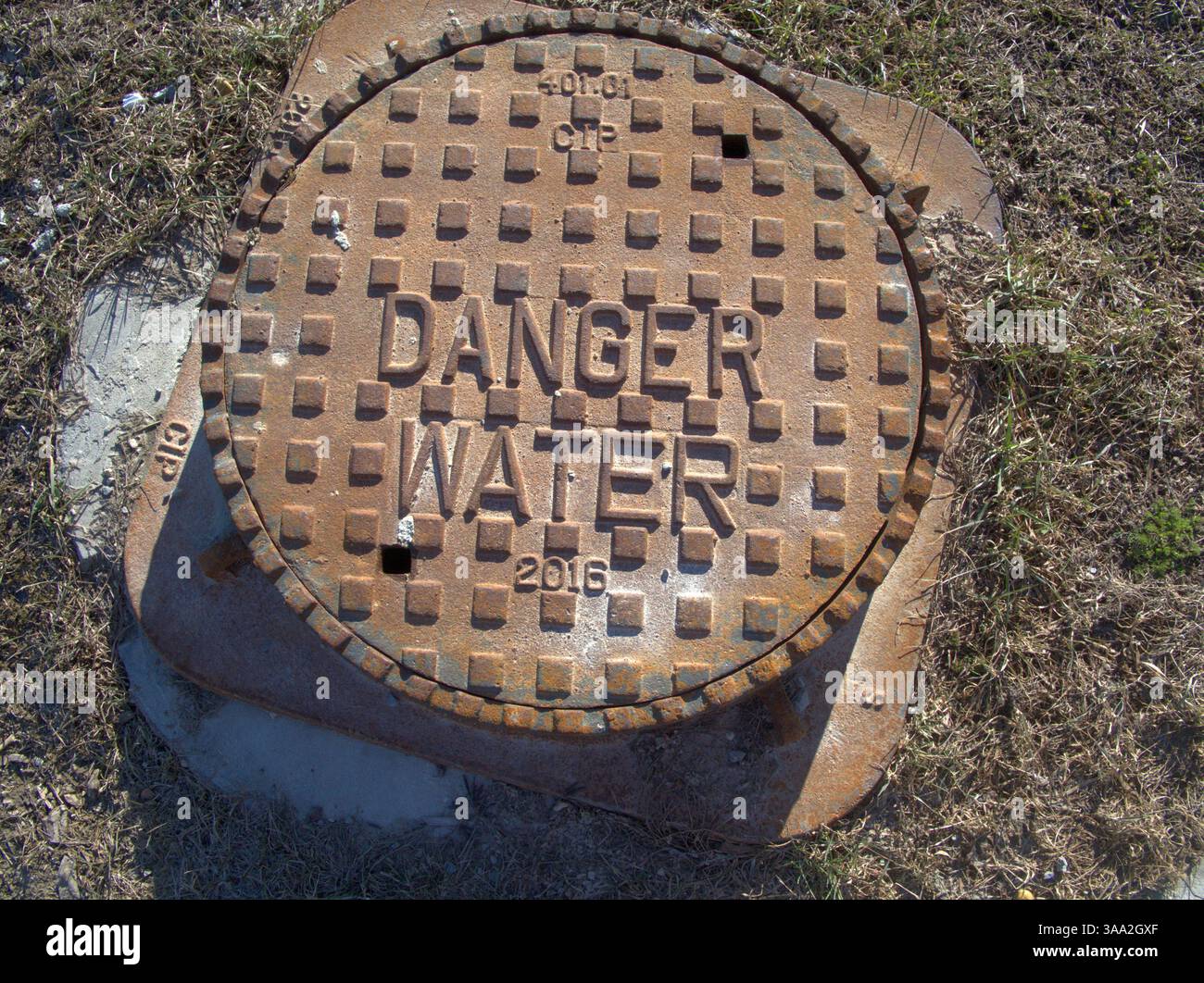 Safety message clearly cast into metal cautions residents to respect ...