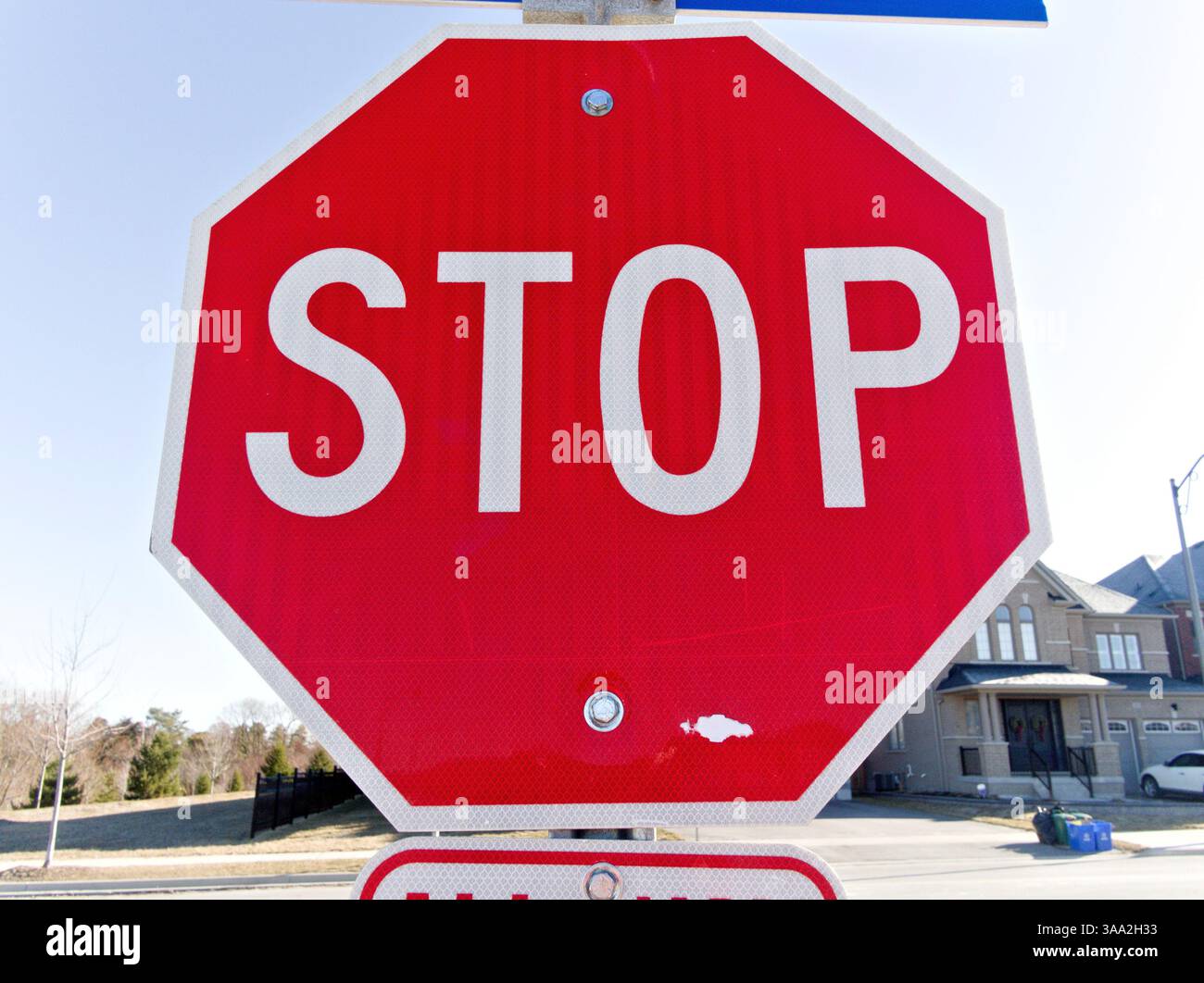 The universally recognized stop sign highlighted clearly against a ...