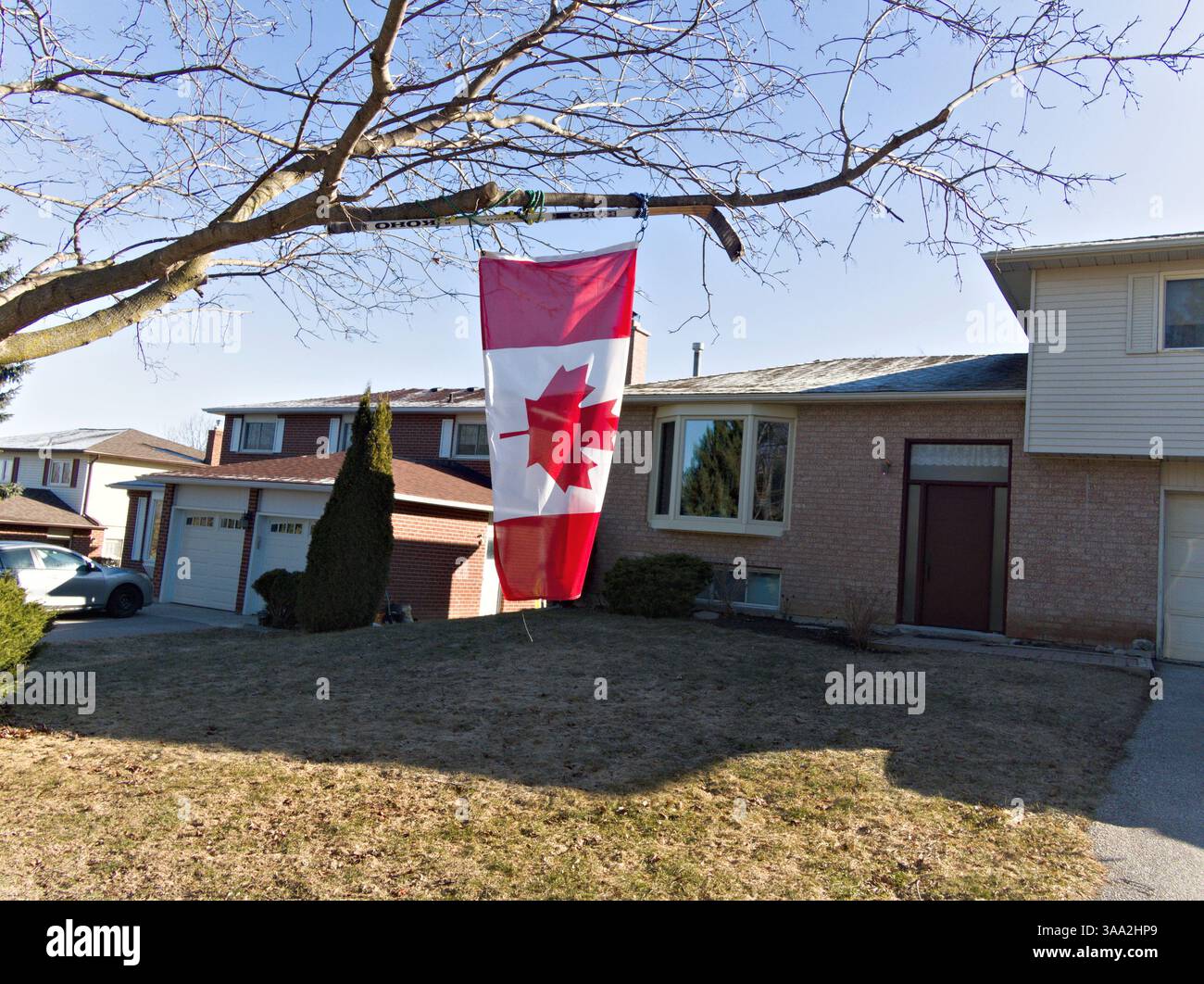 A perfect nighborhood. Average residential house with concrete pathway ...