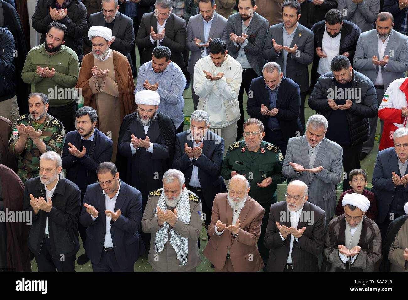 Tehran, Iran. 31st Mar, 2025. Iranian worshippers perform Eid al-Fitr ...