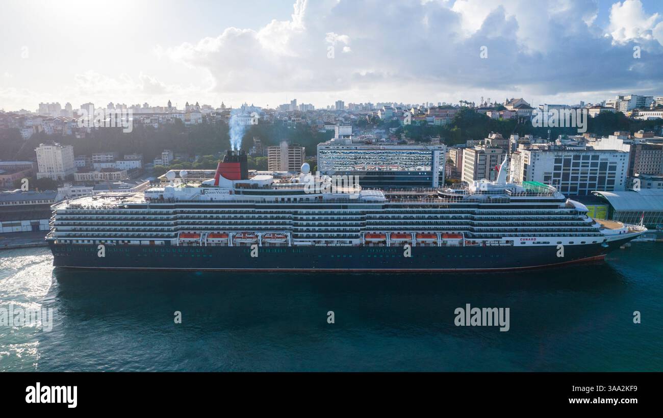 MS Queen Victoria cruiser ship anchored in the port with the city in ...