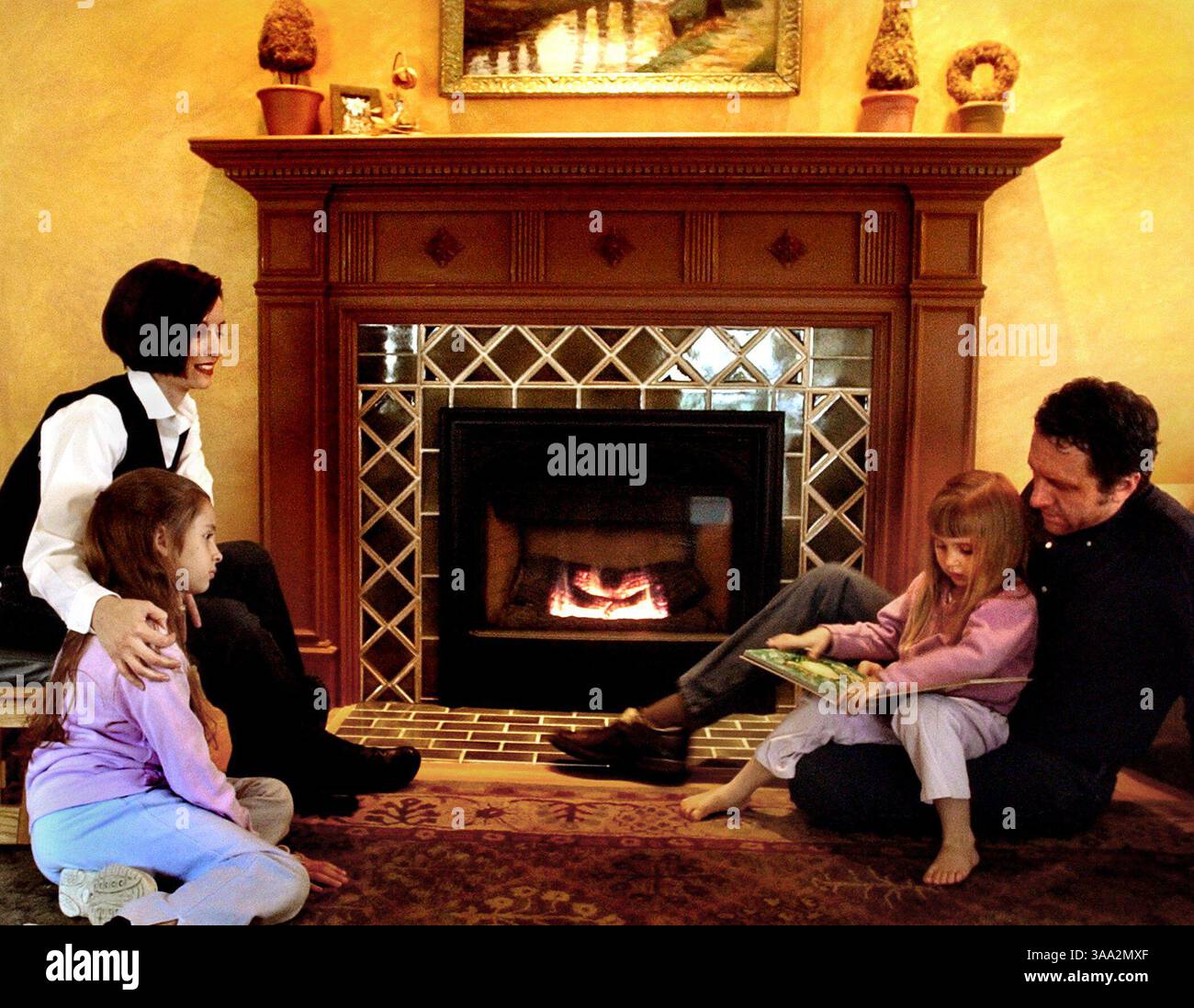 Jennifer and Joe Tillman and daughters Nora, 7, and Emma, 4, gather ...