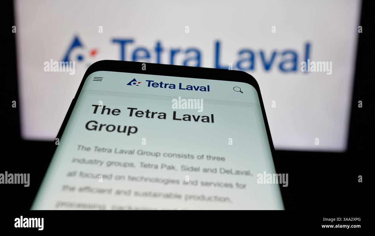 In this photo illustration, a mobile phone with the logo of packaging ...