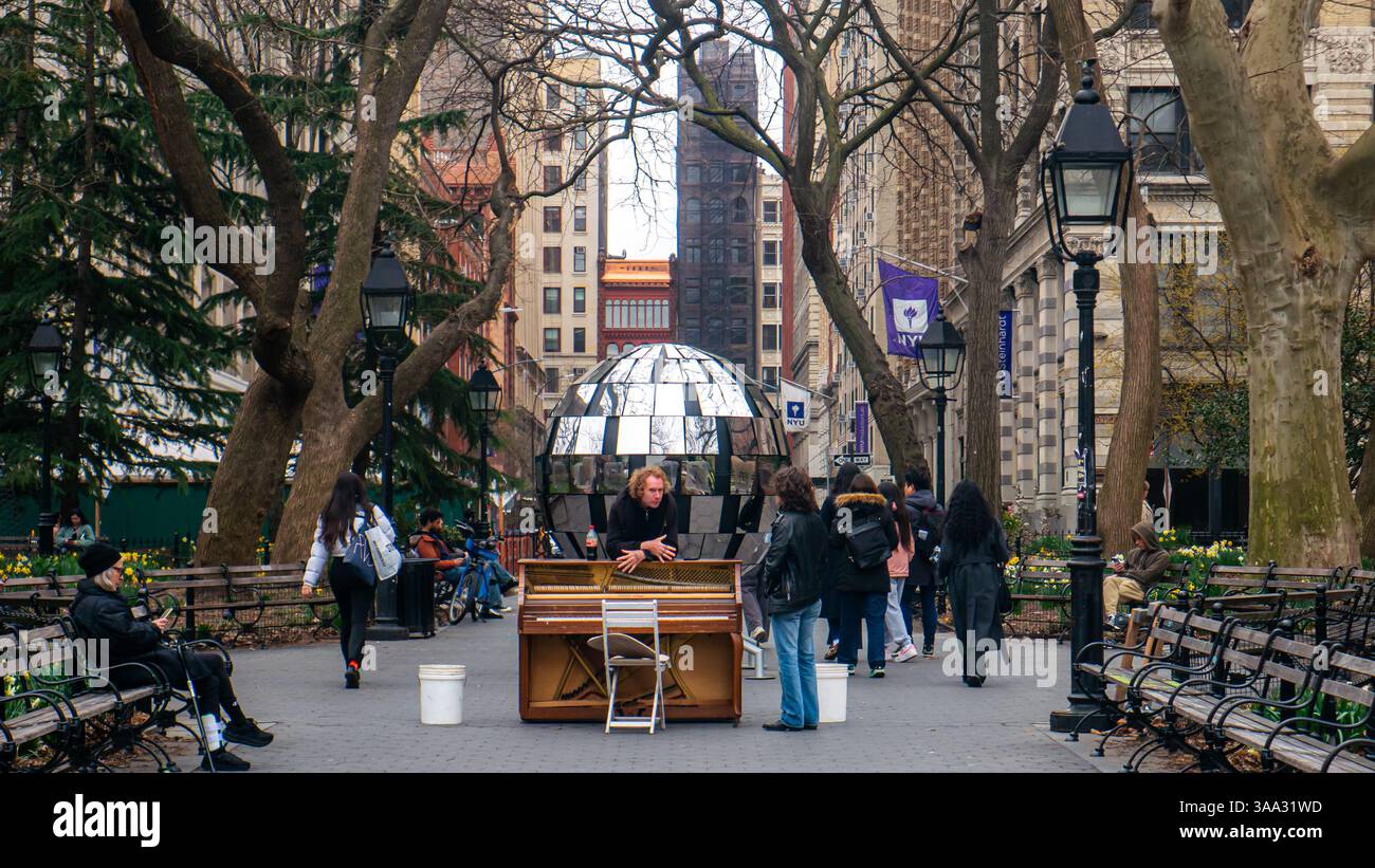 New York City, USA. 30th March, 2025. A man leans against a piano in ...