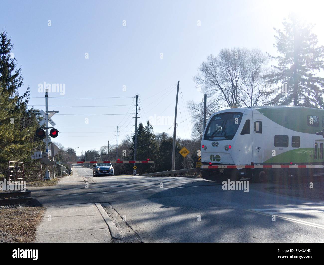 Active railway gate clearly indicating imminent train passage ...