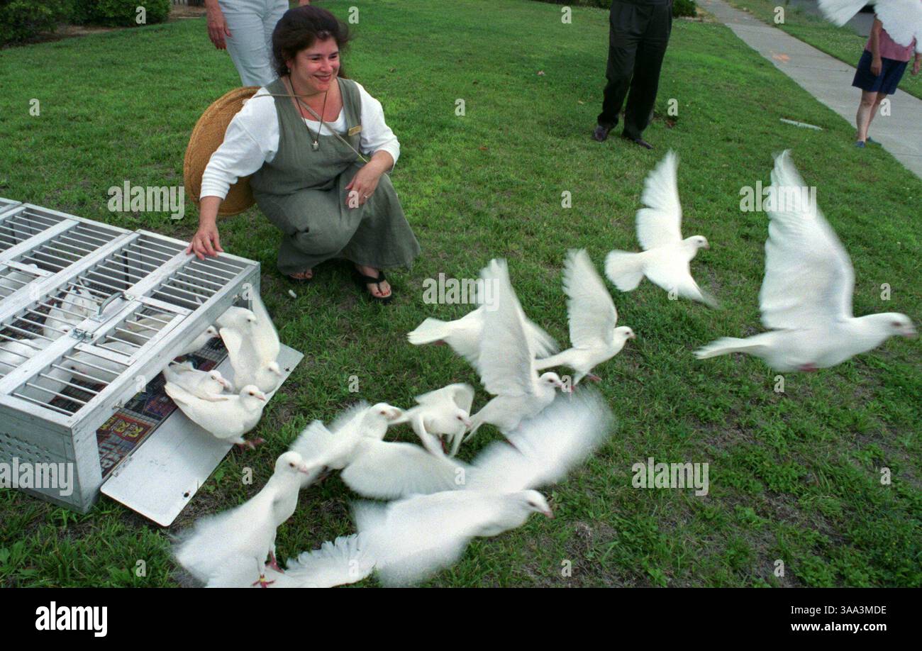 Anna Lisa Hernandez releases homing pigeons at a Fourth of July event ...