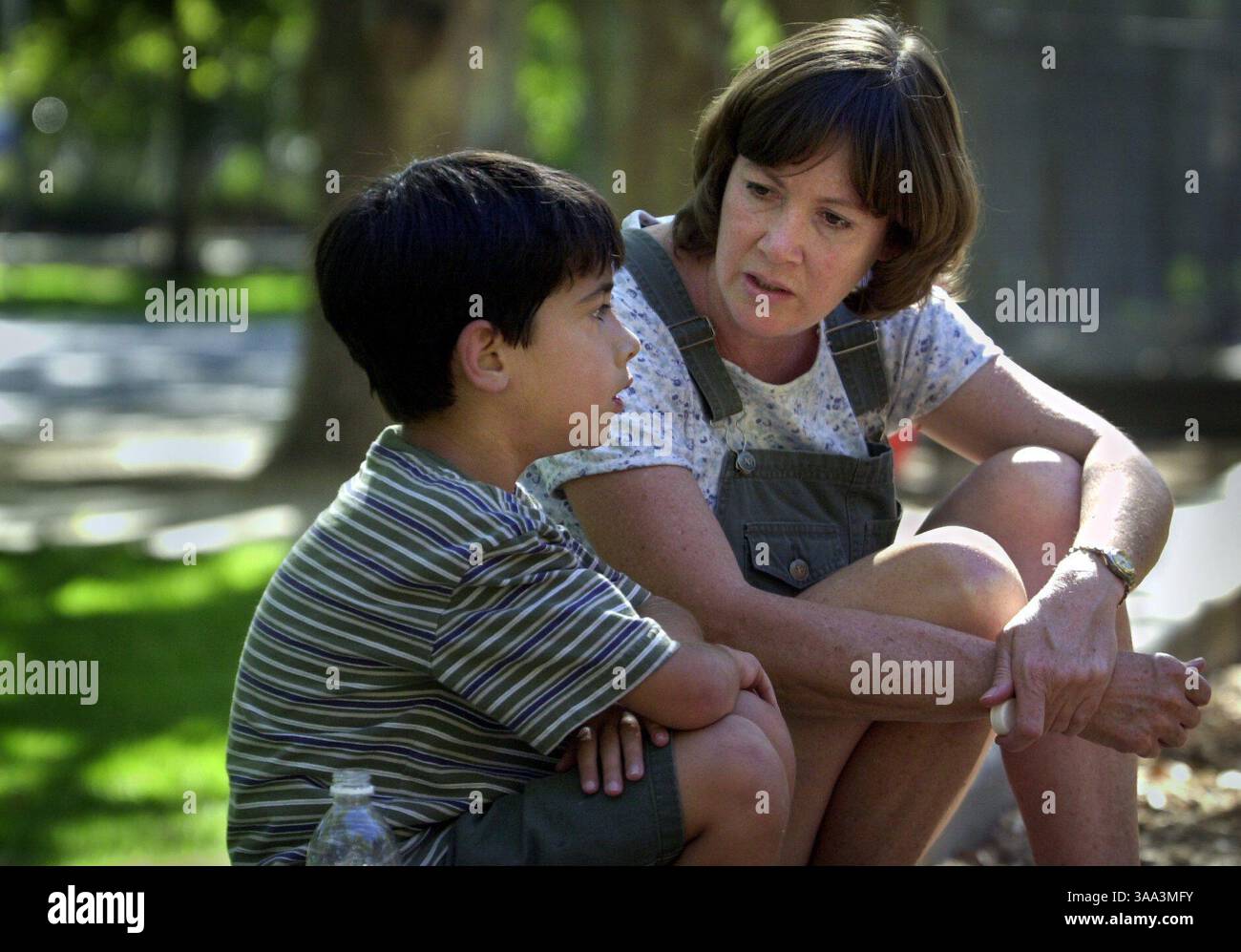 Children playing tag in a park hi-res stock photography and images - Alamy