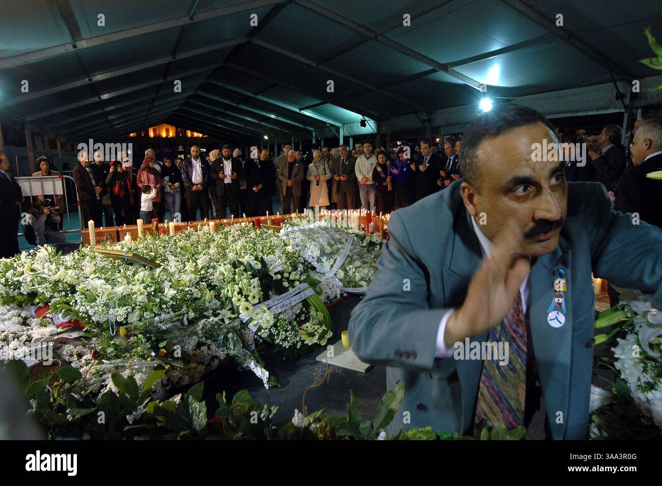 Mar 24, 2005; Beirut, LEBANON; A guard controls the cowds visiting the ...