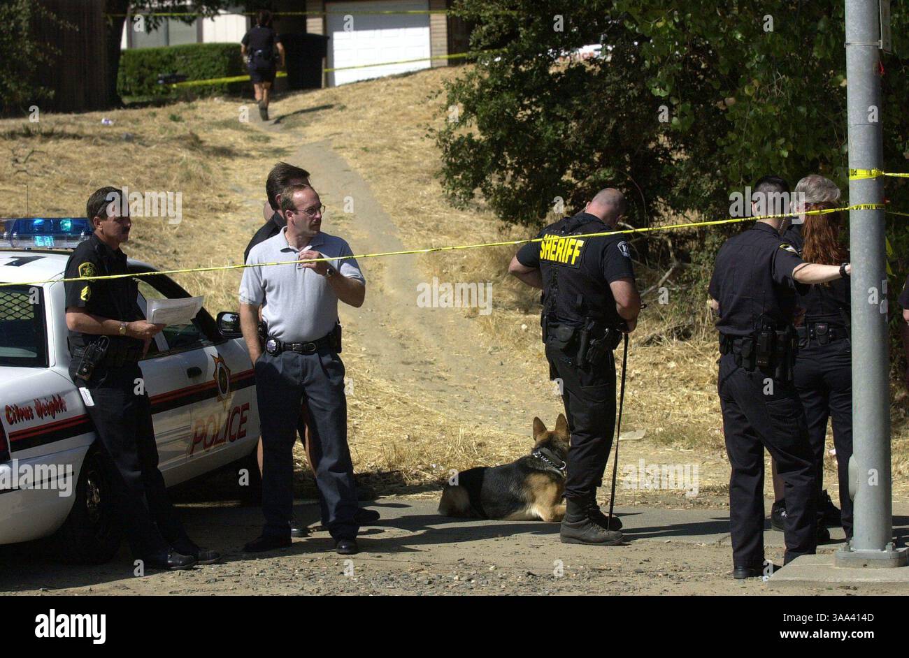 -- Thursday, August 30, 2001, Sacramento, Calif. -- Officers from the ...