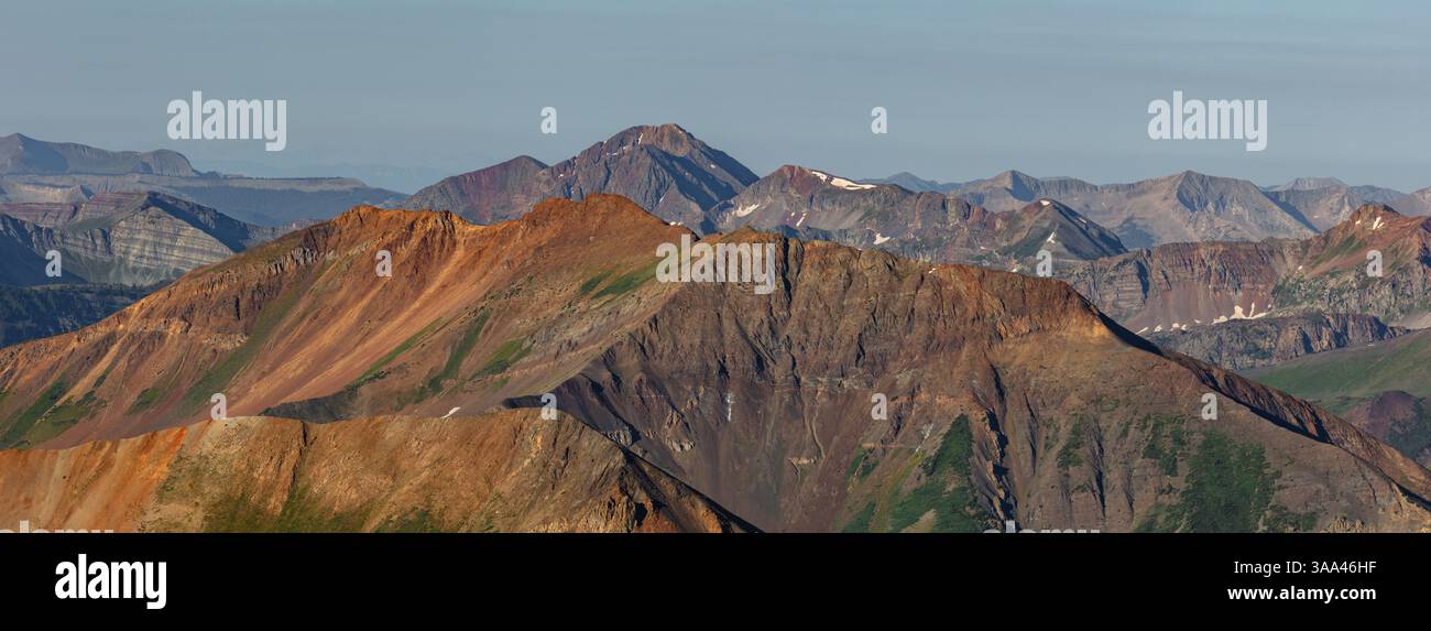 The vibrant orange colors of Mount Baldy (12,805') in the Elk range ...