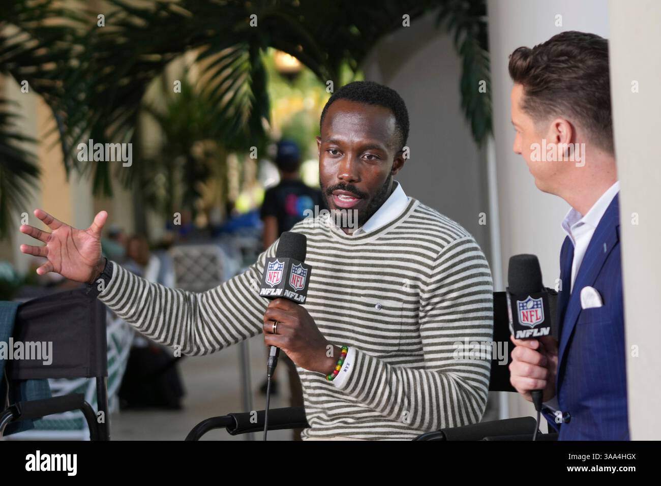 Minnesota Vikings general manager Kwesi Adofo-Mensah, left, is ...