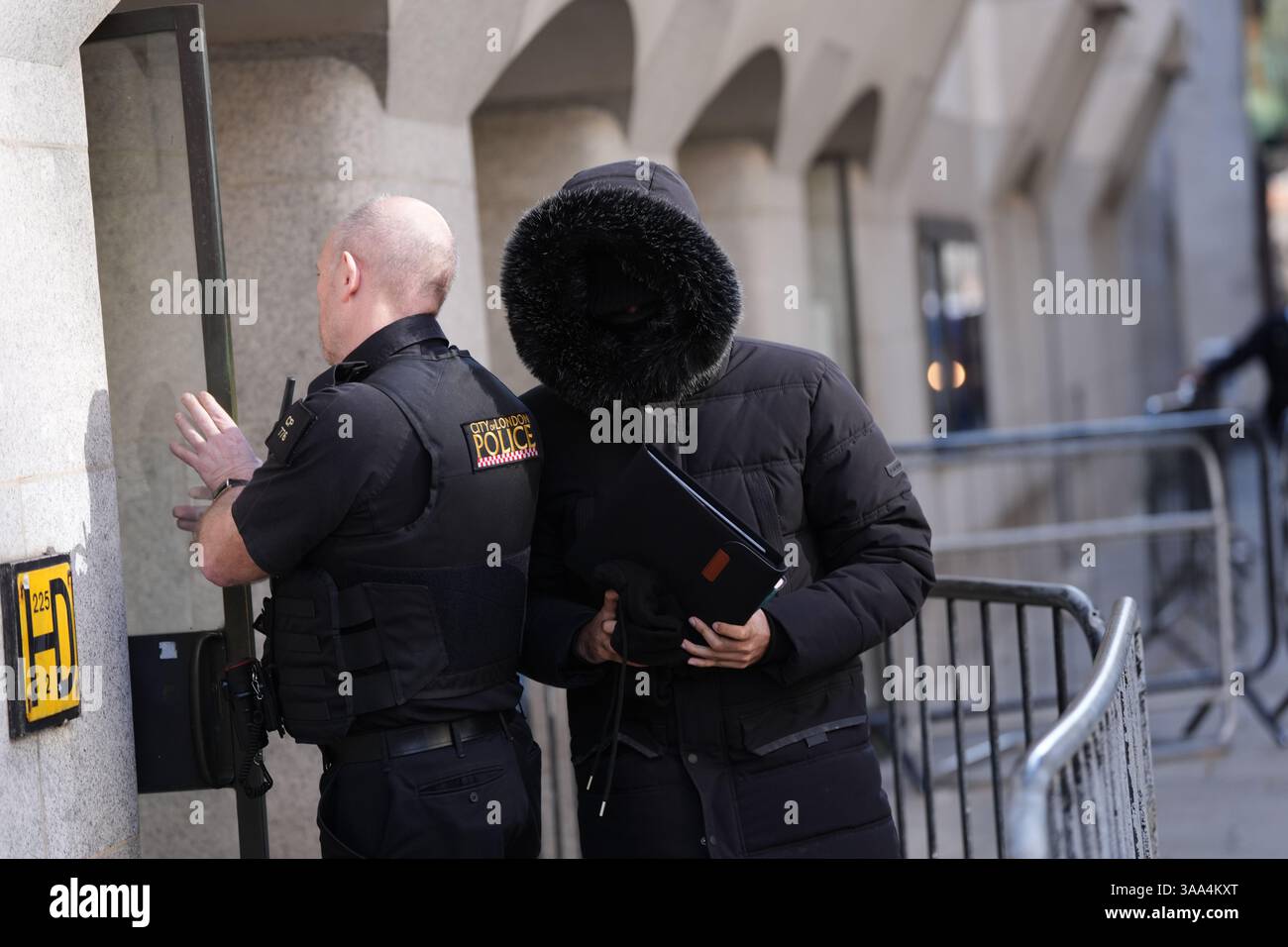 Former GCHQ staff member, Hasaan Arshad, leaving the Old Bailey ...