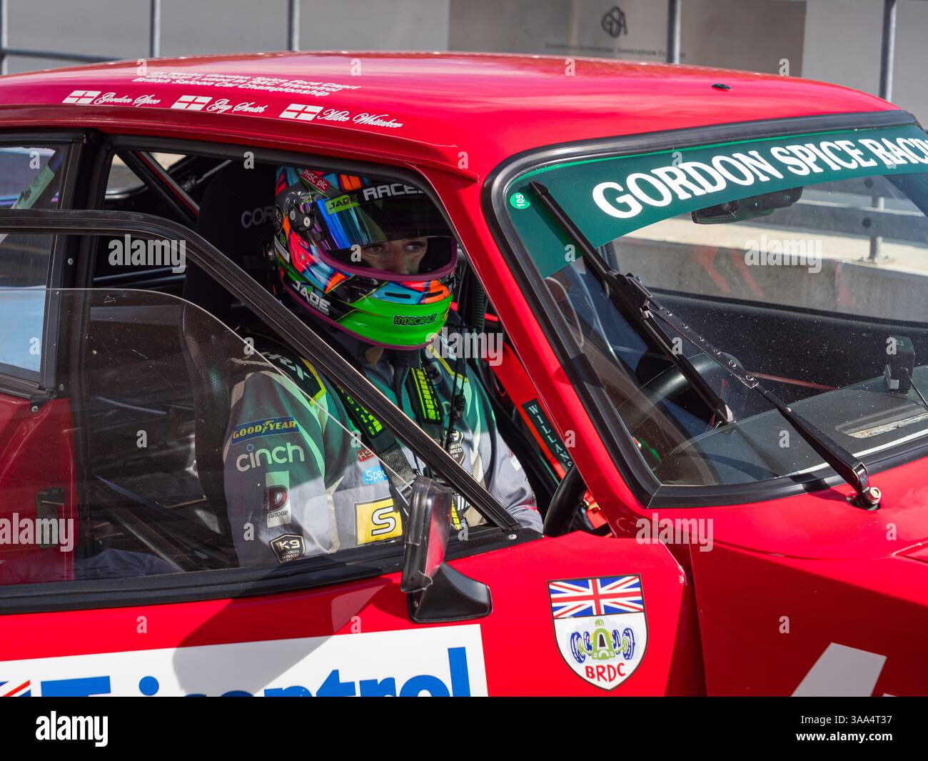 Female racing car driver Jade Edwards sitting in a Ford Capri racing ...