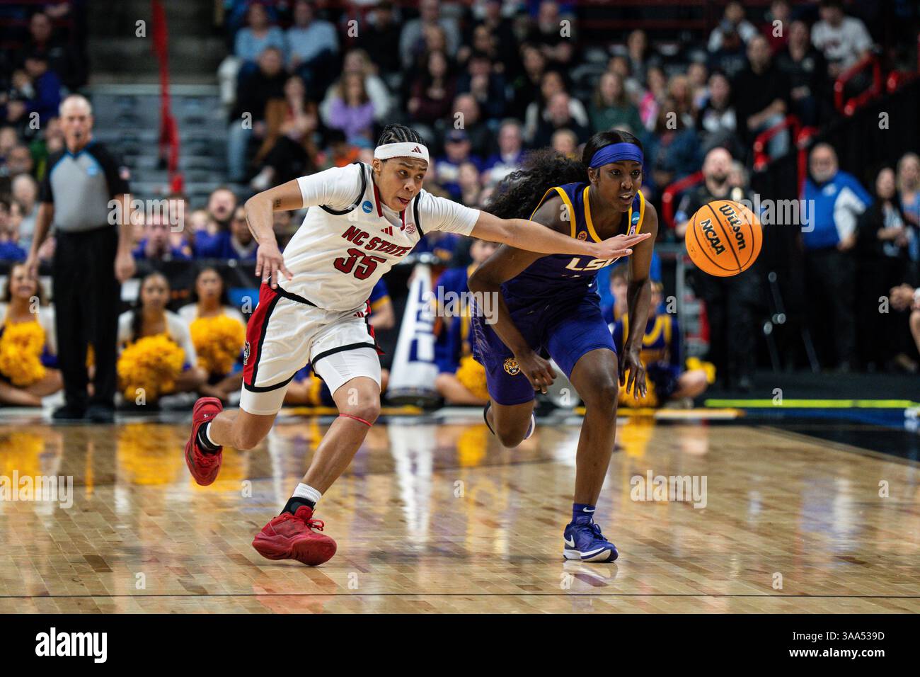 NC State Wolfpack guard Zoe Brooks (35) and LSU Tigers guard Flau'Jae ...