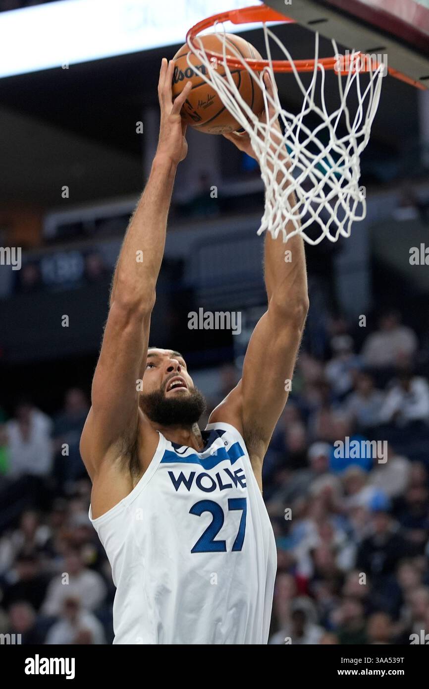 Minnesota Timberwolves center Rudy Gobert (27) dunks during the first half of an NBA basketball ...