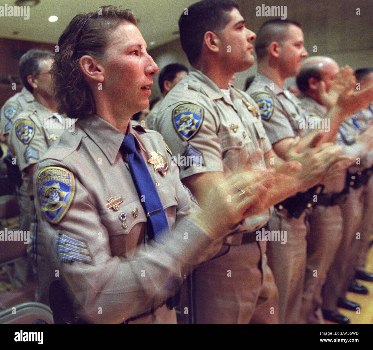 California Highway Patrol officers Amy Mangan left; Mark Garcia right ...
