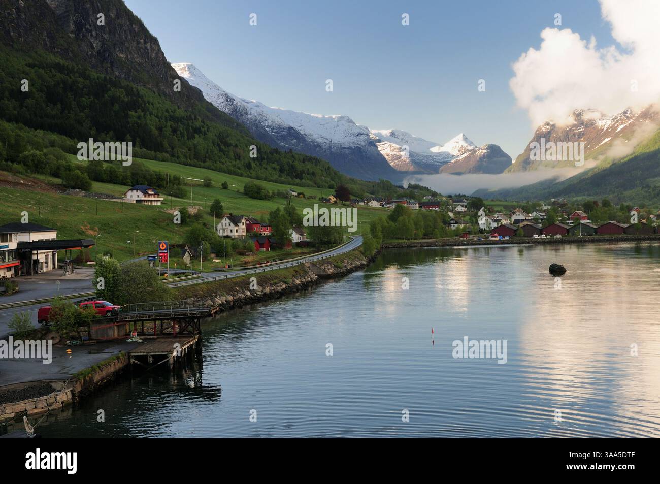 Early morning low cloud and snow capped mountains at Olden in Western ...