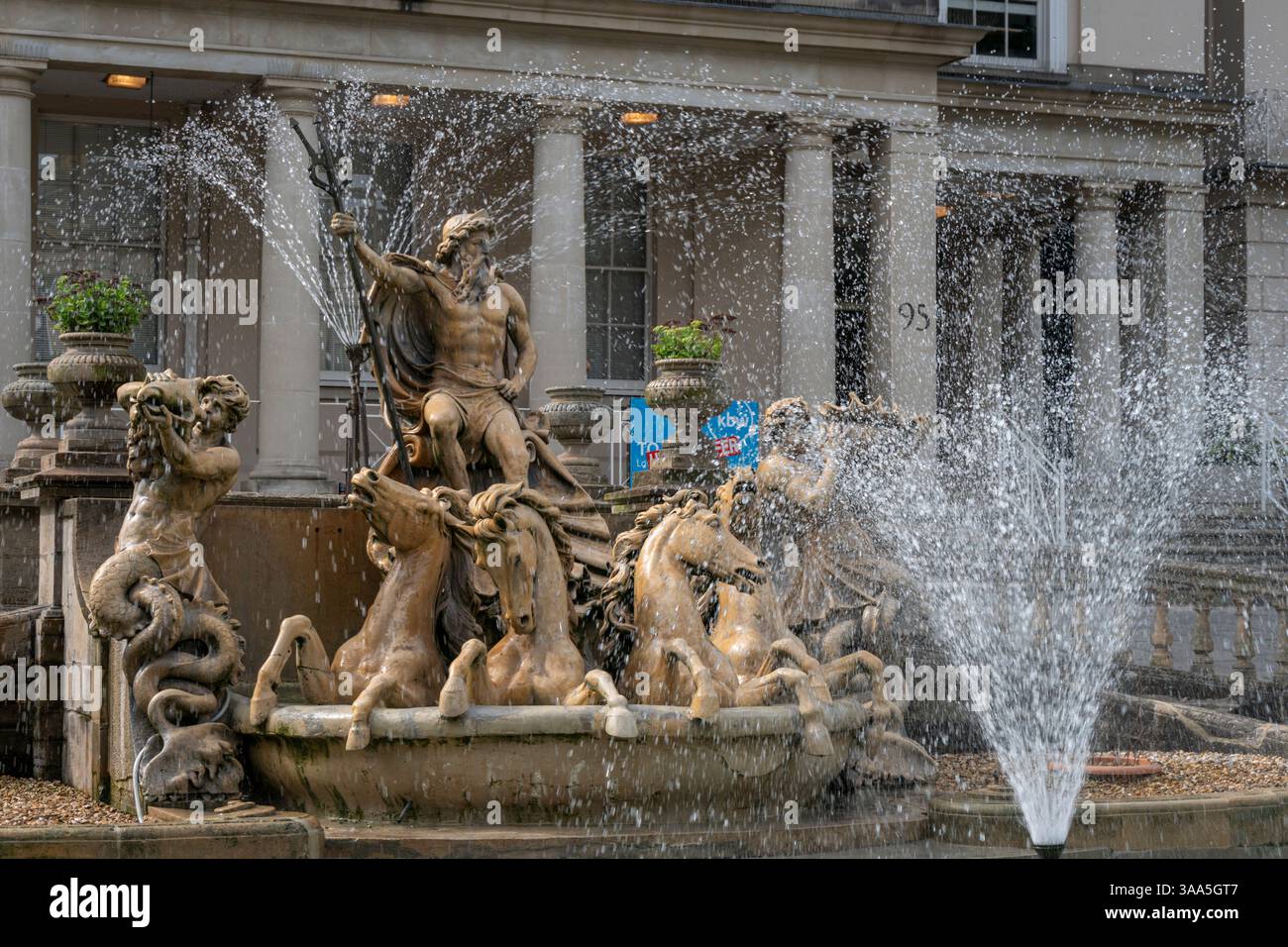 Neptune fountain located in Cheltenham town centre, England Stock Photo ...