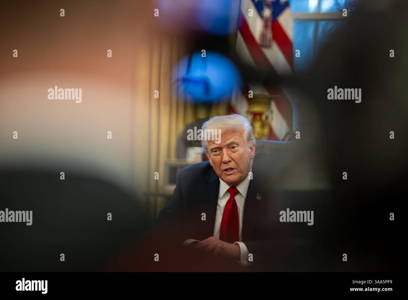 President Donald Trump announces tariffs on auto imports in the Oval ...