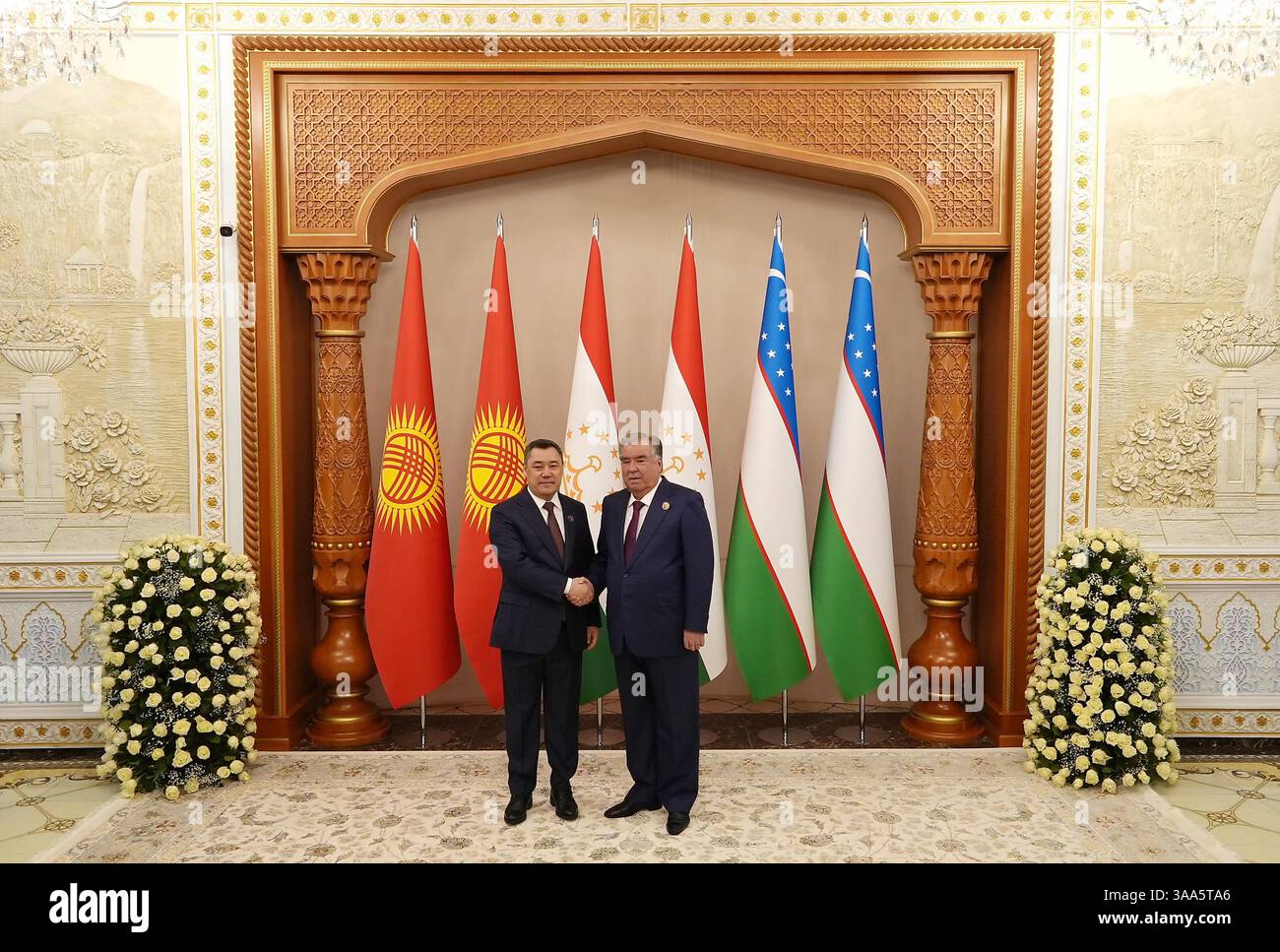 Khujand, Tajikistan. 31st Mar, 2025. Tajik President Emomali Rahmon (R ...