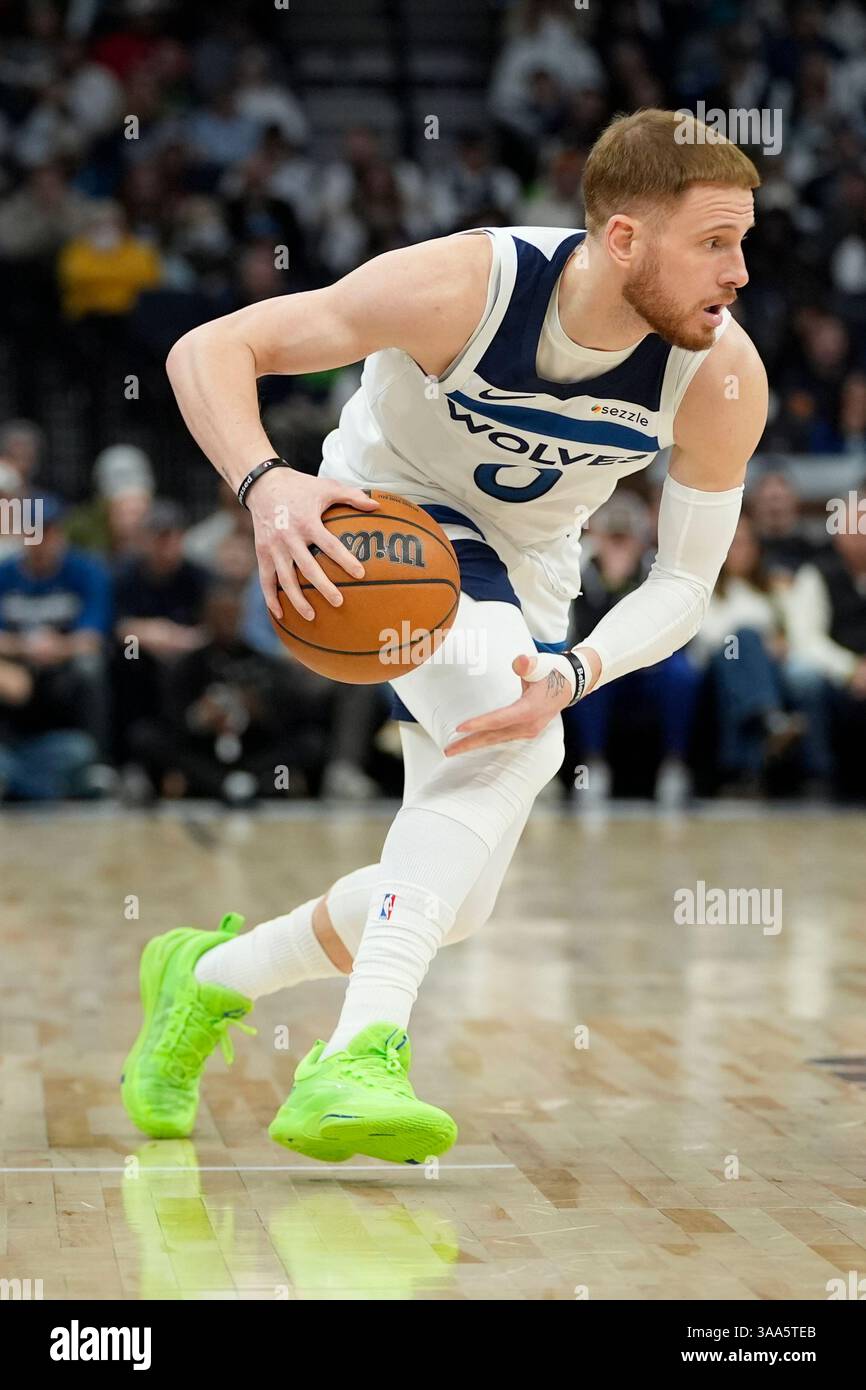 Minnesota Timberwolves guard Donte DiVincenzo (0) works toward the ...