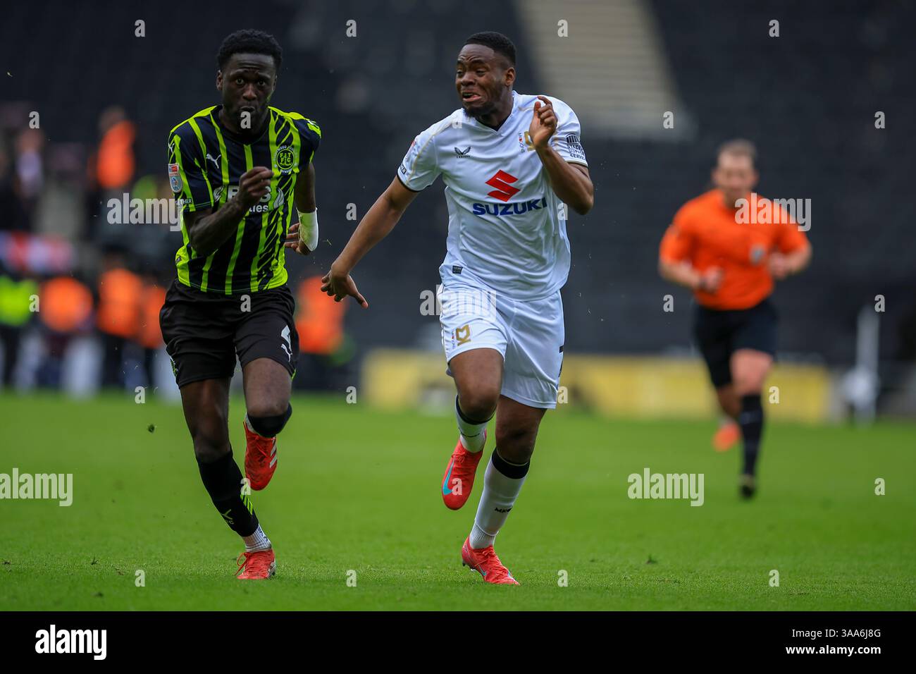 Milton Keynes Dons Forward Jonathan Leko (7) Under Pressure from ...