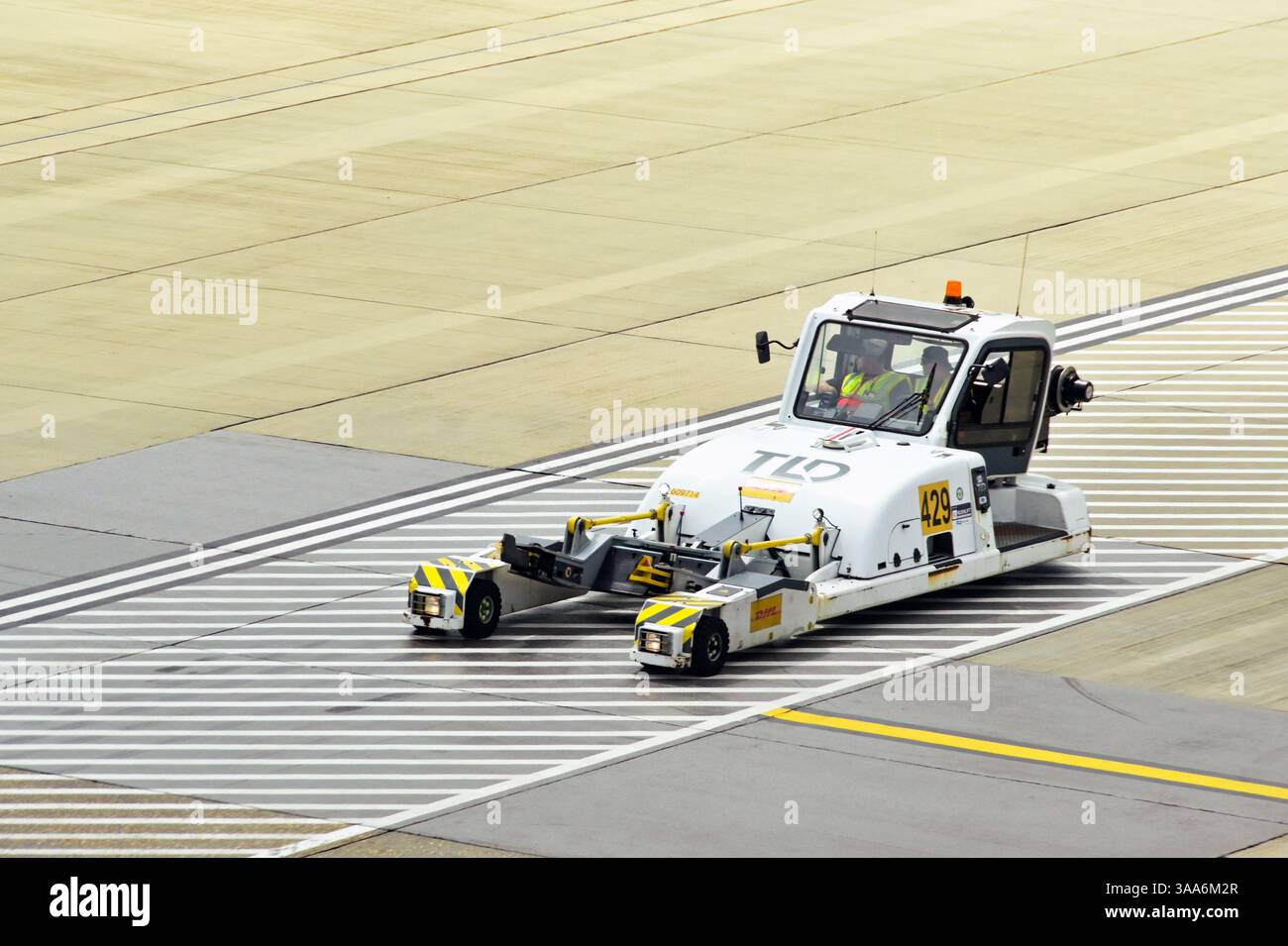 London, England, UK - 1 August 2023: Small tractor vehicle used to push ...