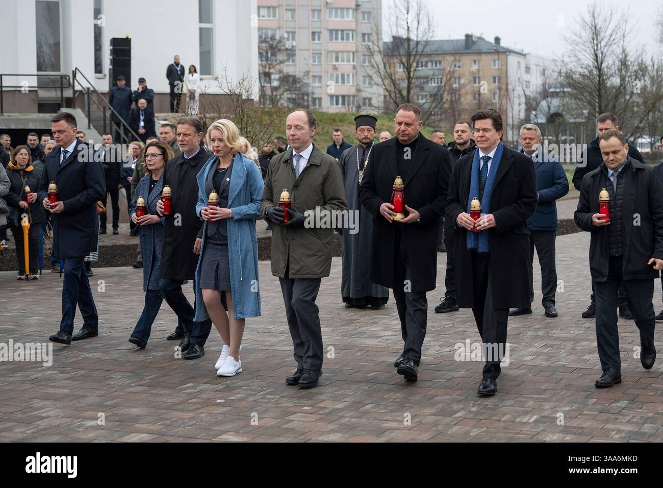 Bucha, Ukraine. 31 March, 2025. Parliamentary leaders walk together in ...