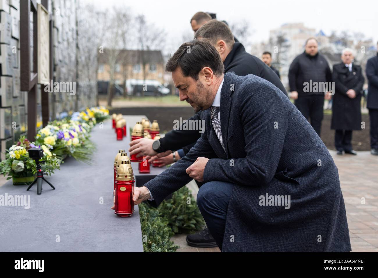 Bucha, Ukraine. 31 March, 2025. Parliamentary leaders place lanterns ...