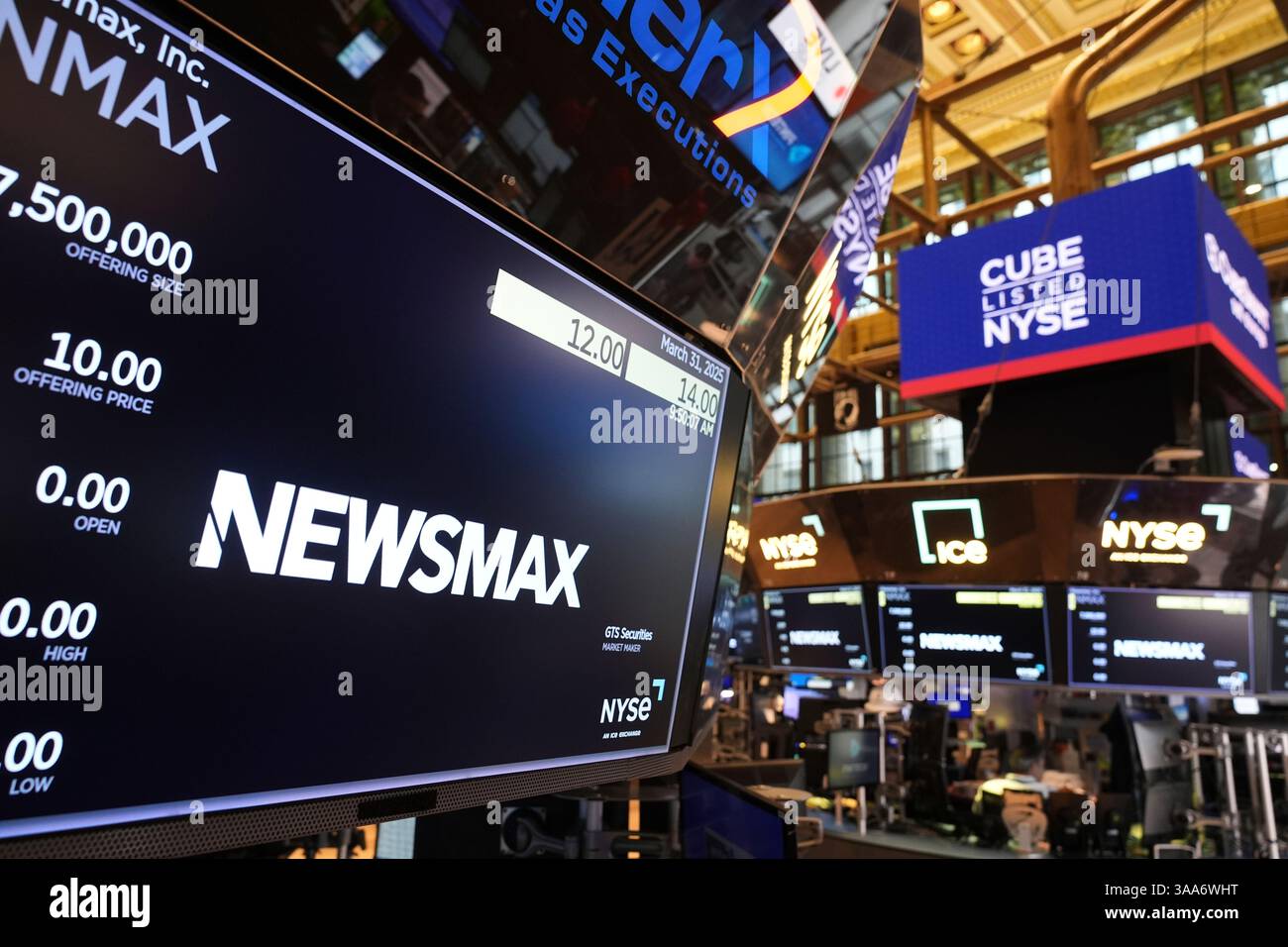 A display shows a Newsmax logo on the day of their IPO on the floor at ...