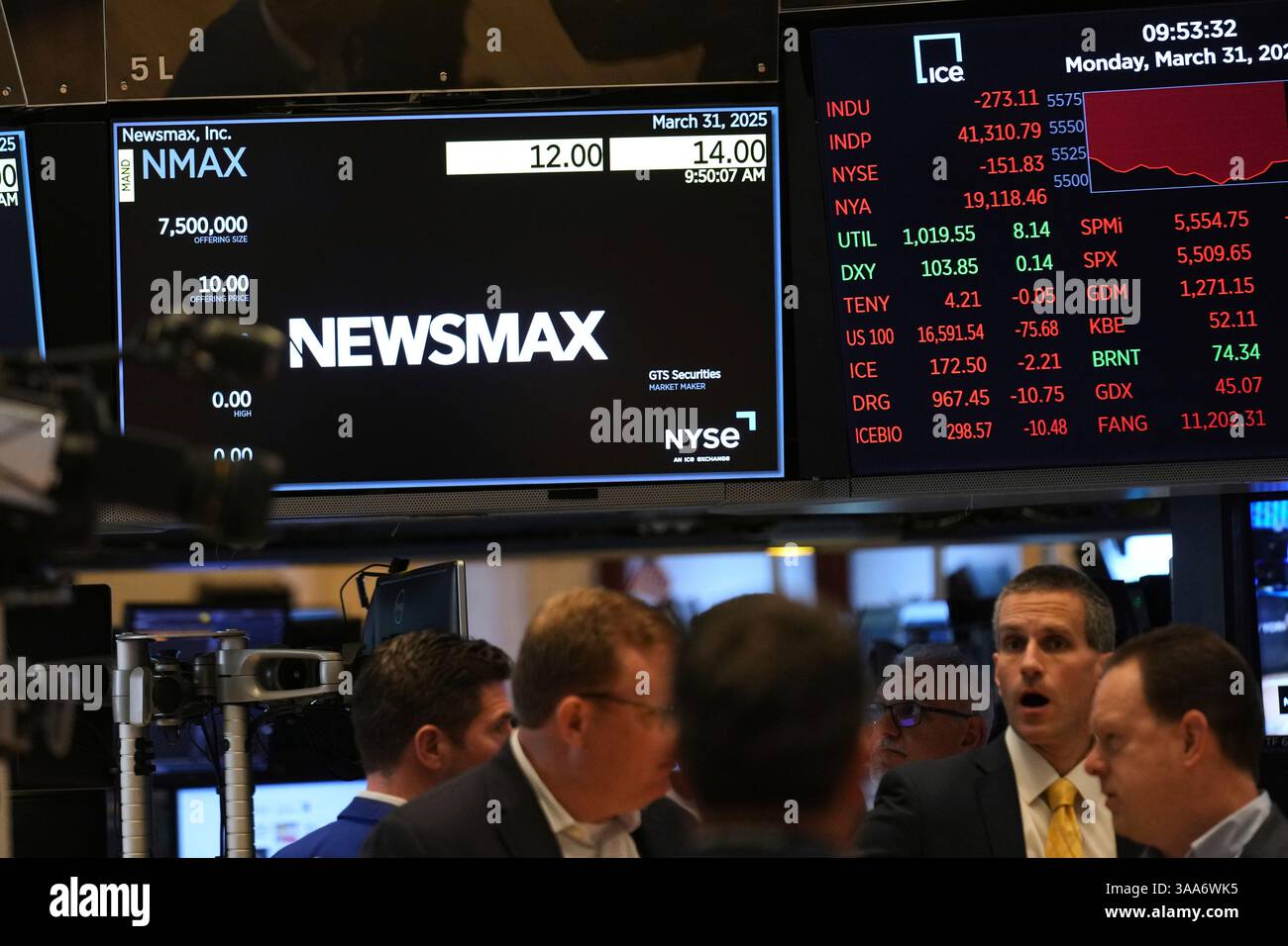 A display shows a Newsmax logo on the day of their IPO on the floor at ...