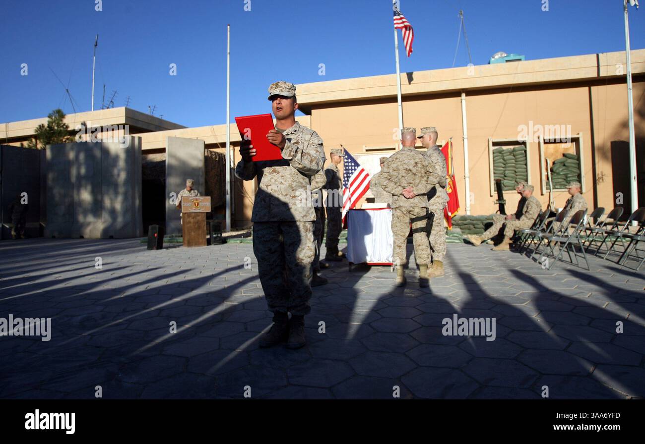 Nov 10, 2006; Asad, IRAQ; Capt. BLAS AVILA reads during a ceremony in ...