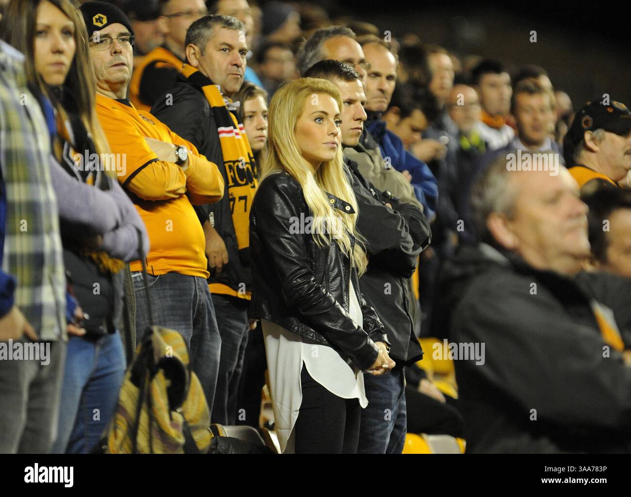 Happy smiling Wolves football fans supporters in the crowd at Molineux ...