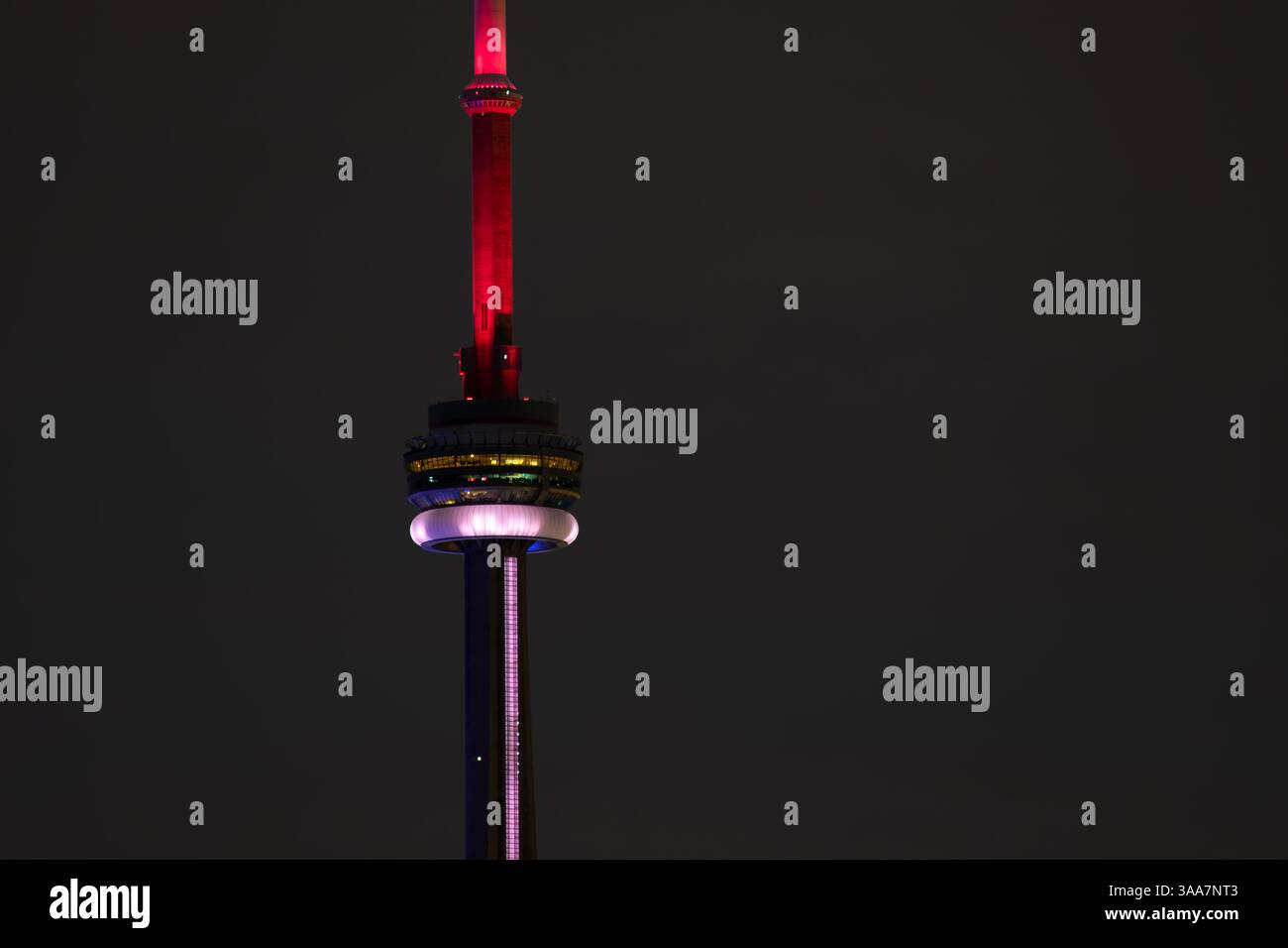 Night view of CN Tower in downtown Toronto, Ontario, with its ...