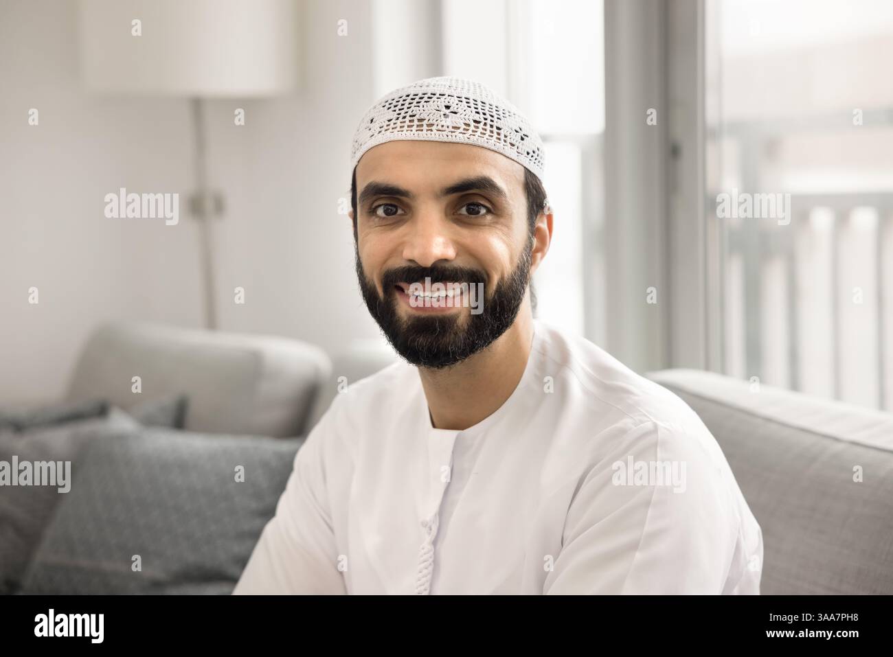 Head shot home portrait of young Middle Eastern man Stock Photo - Alamy